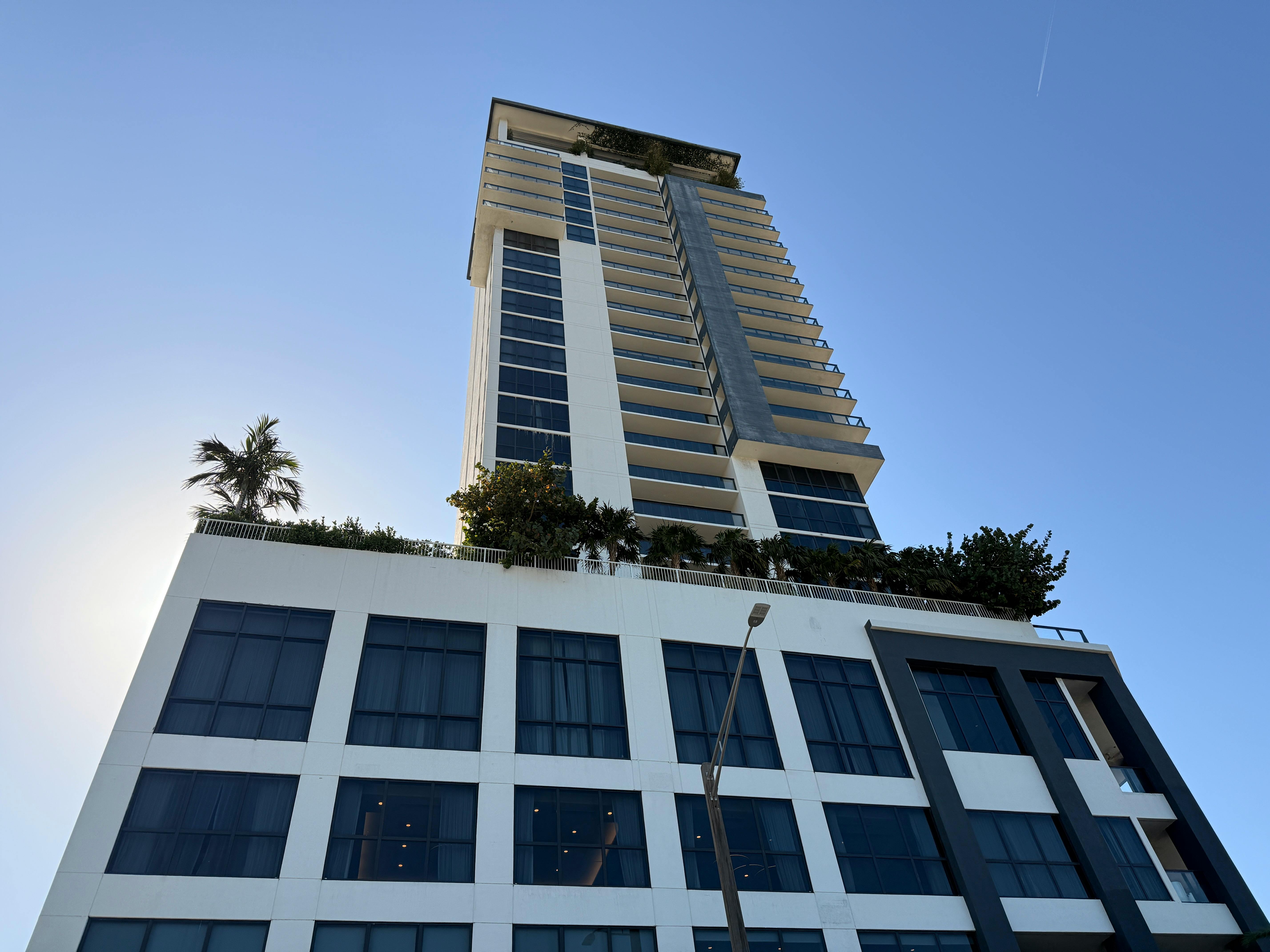Modern High-Rise Building Against Clear Sky · Free Stock Photo