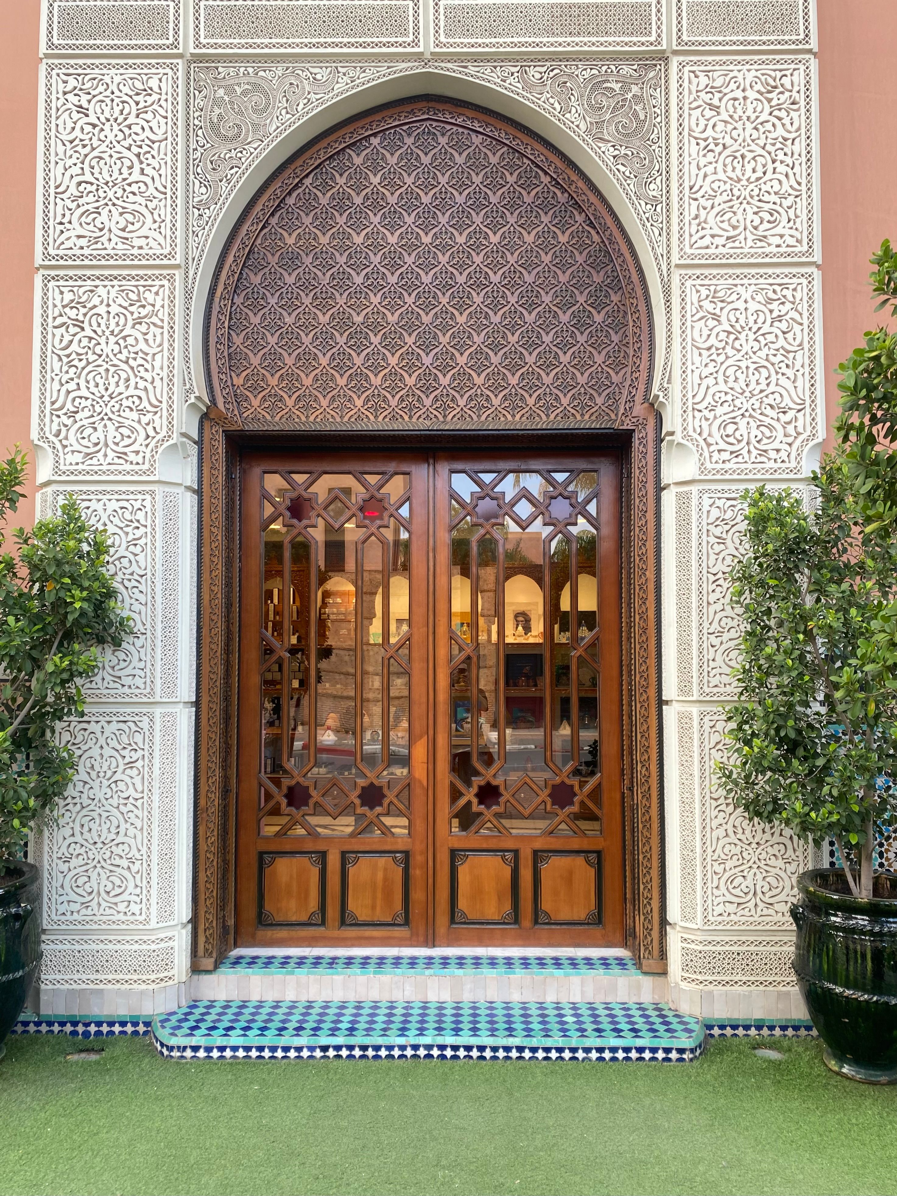 Traditional Moroccan Wooden Door with Ornate Design · Free Stock Photo