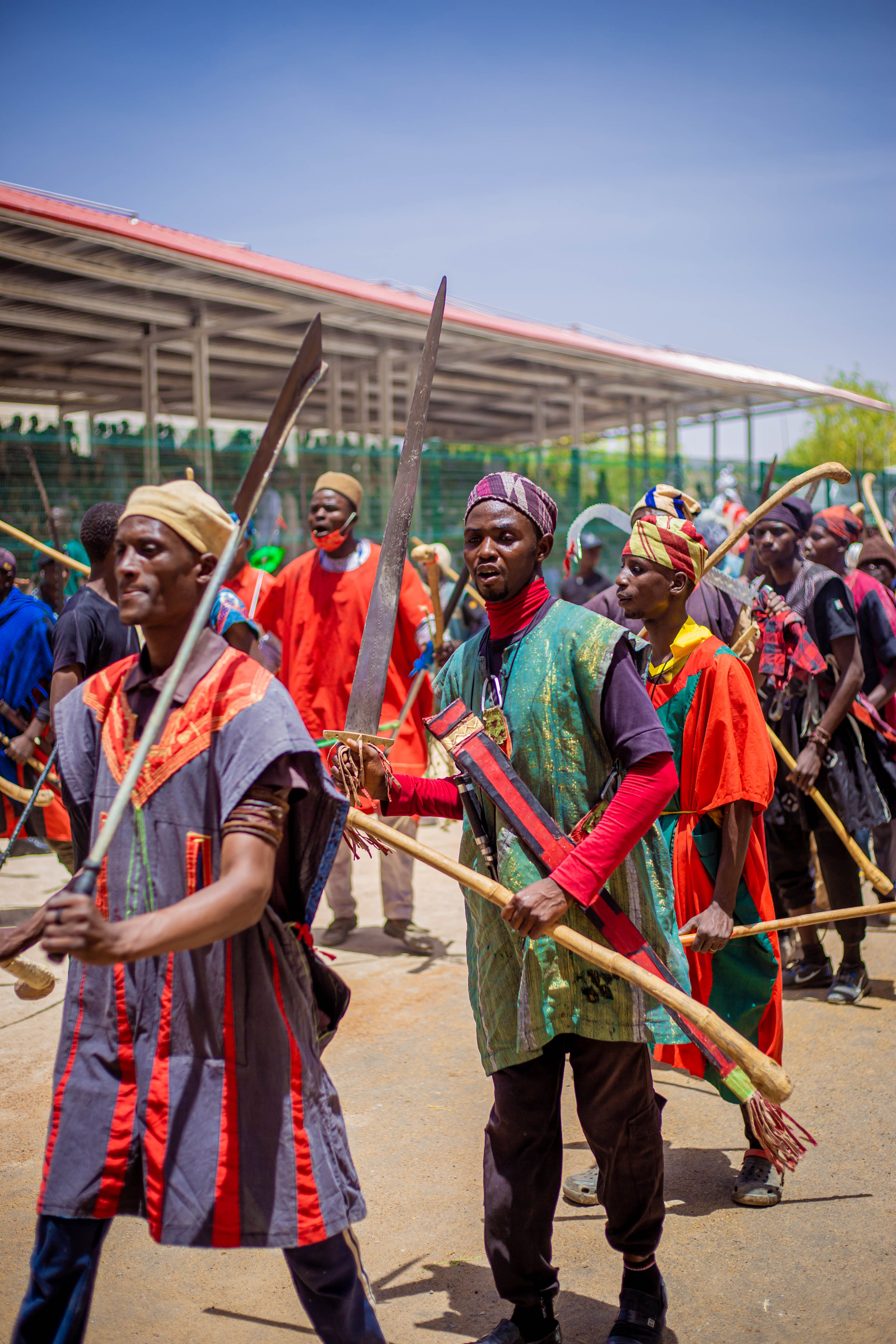 Traditional African Festival Parade with Colorful Attire · Free Stock Photo