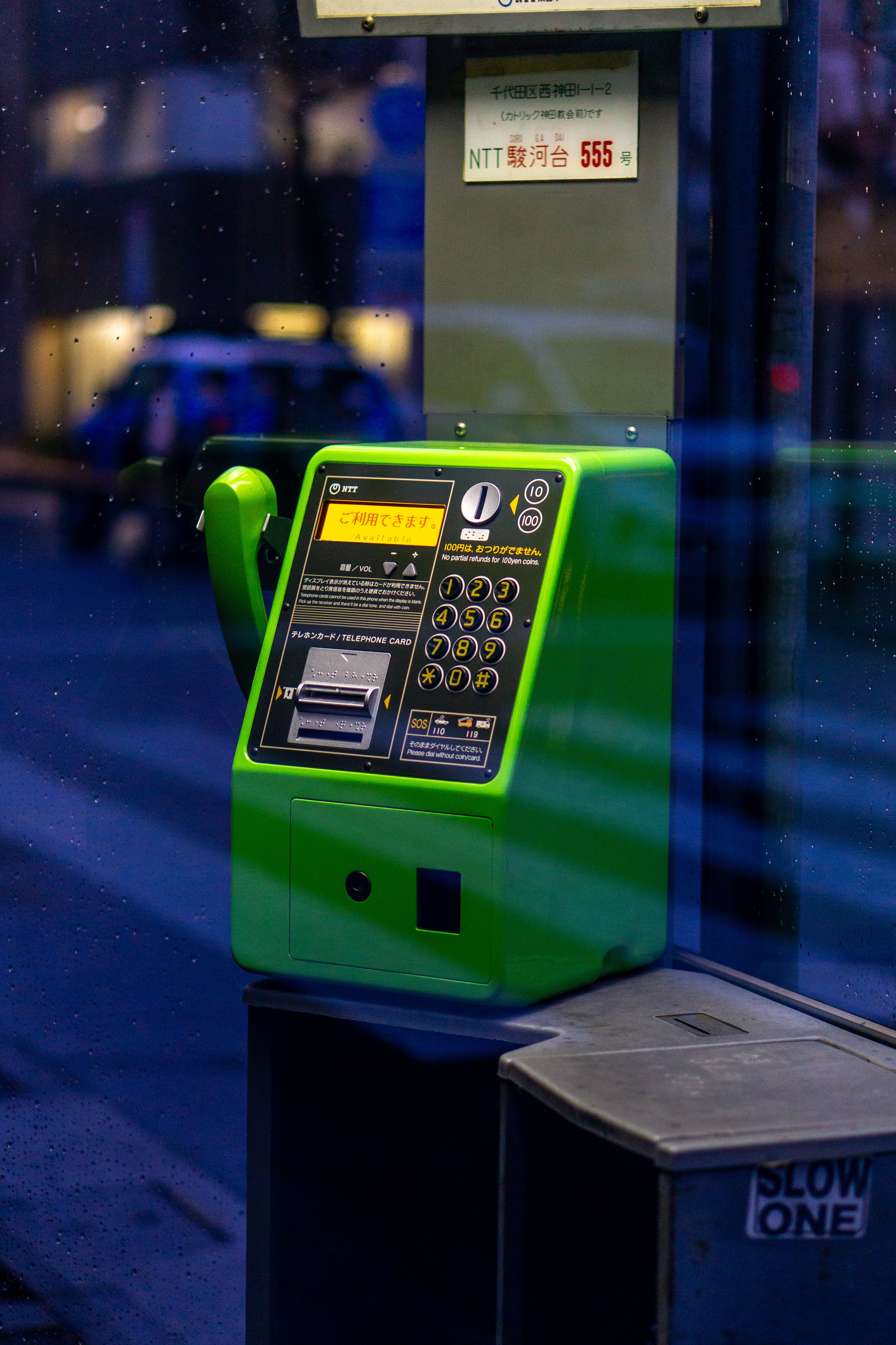 Vibrant Green Public Telephone Booth at Night · Free Stock Photo