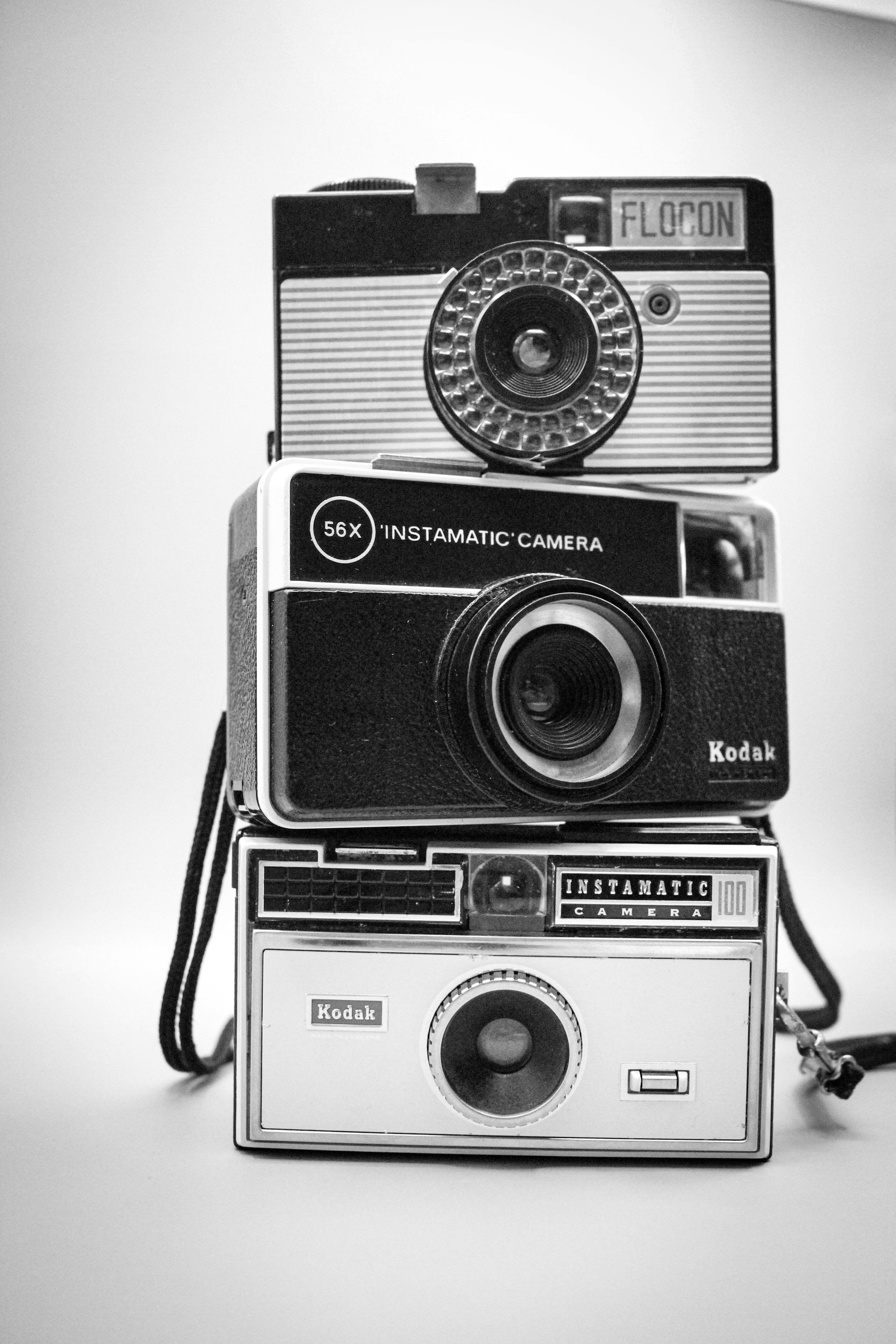 Stack of Vintage Kodak Instamatic Cameras · Free Stock Photo