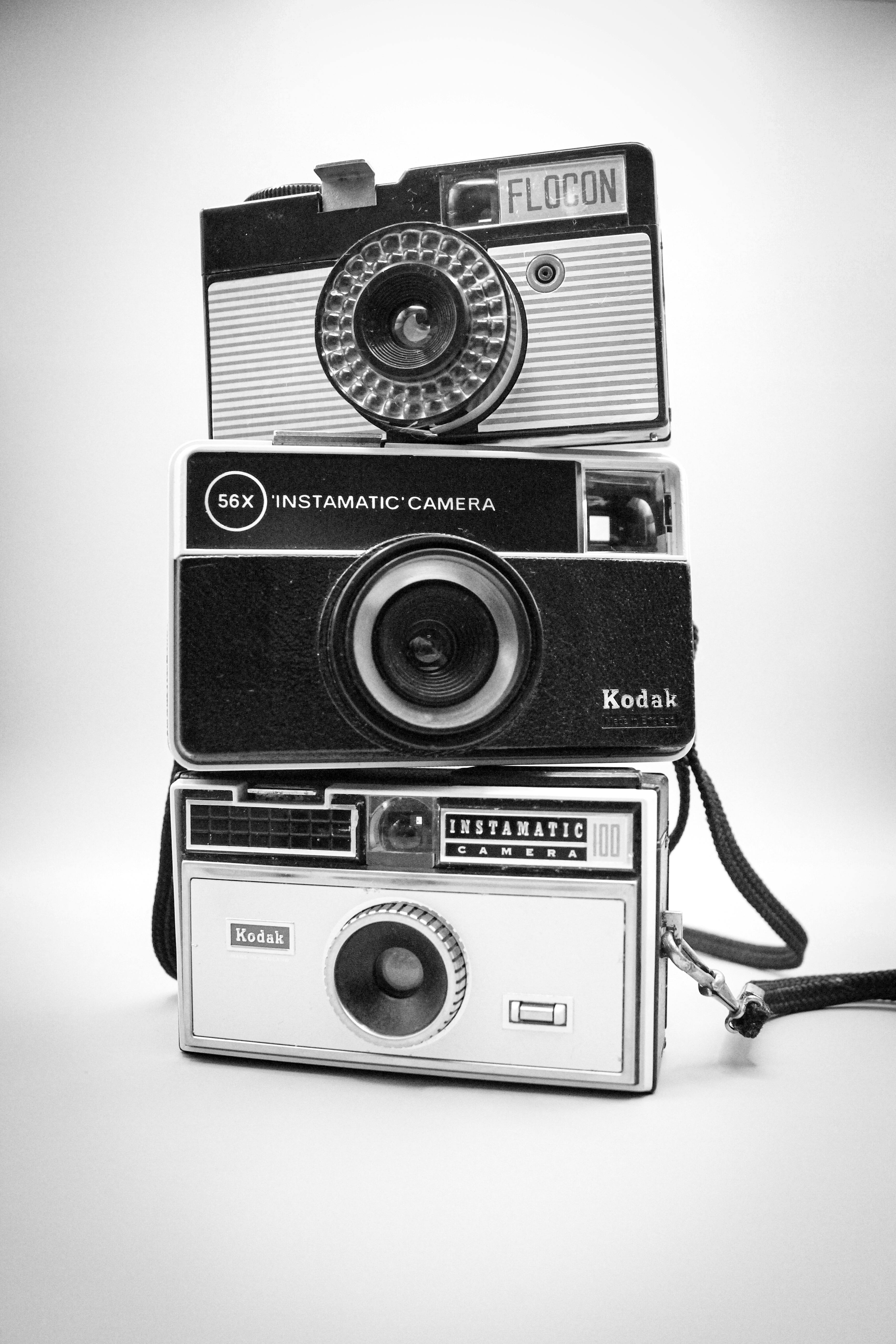 Stack of Vintage Kodak Instamatic Cameras · Free Stock Photo