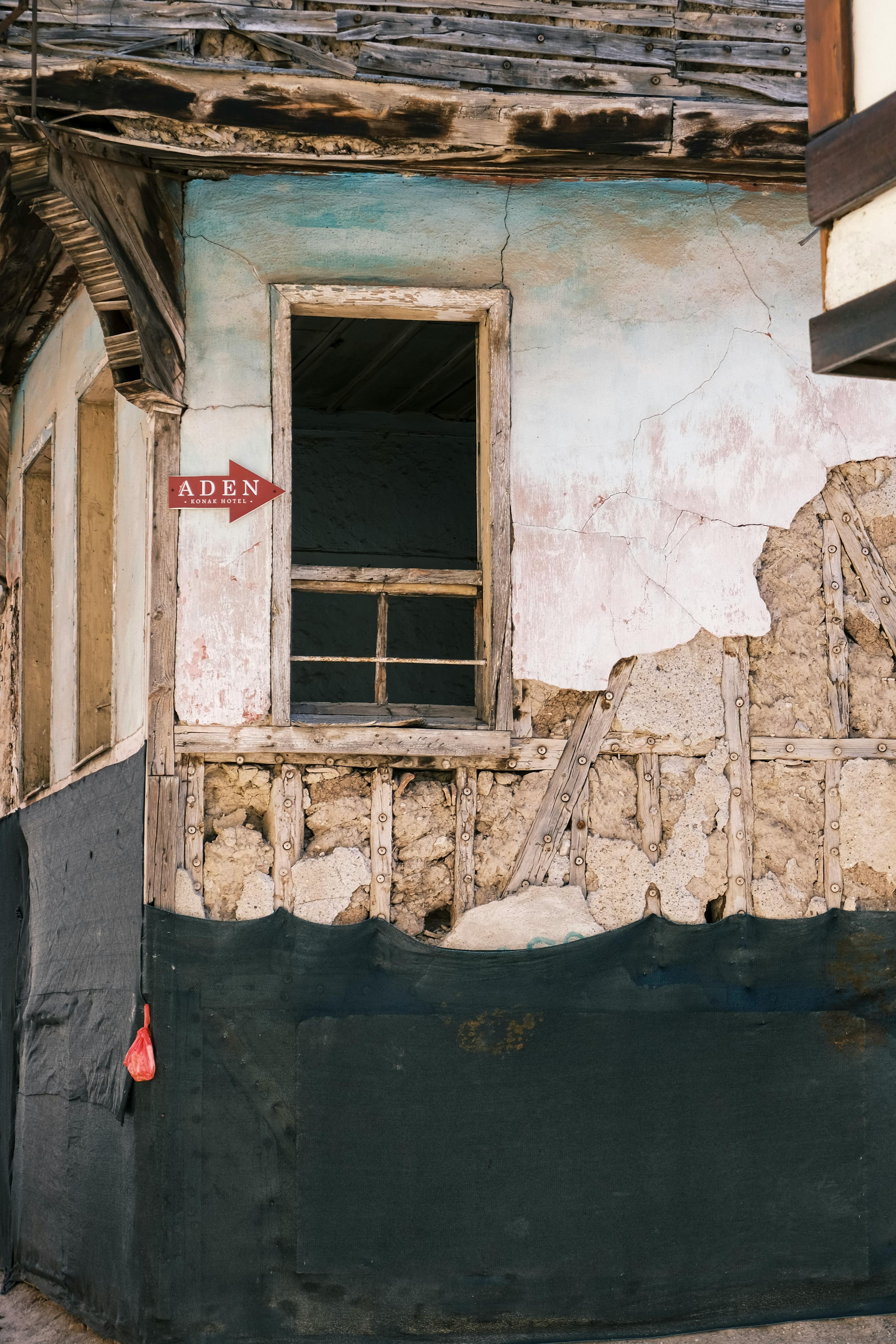 Weathered Building with Exposed Structure · Free Stock Photo