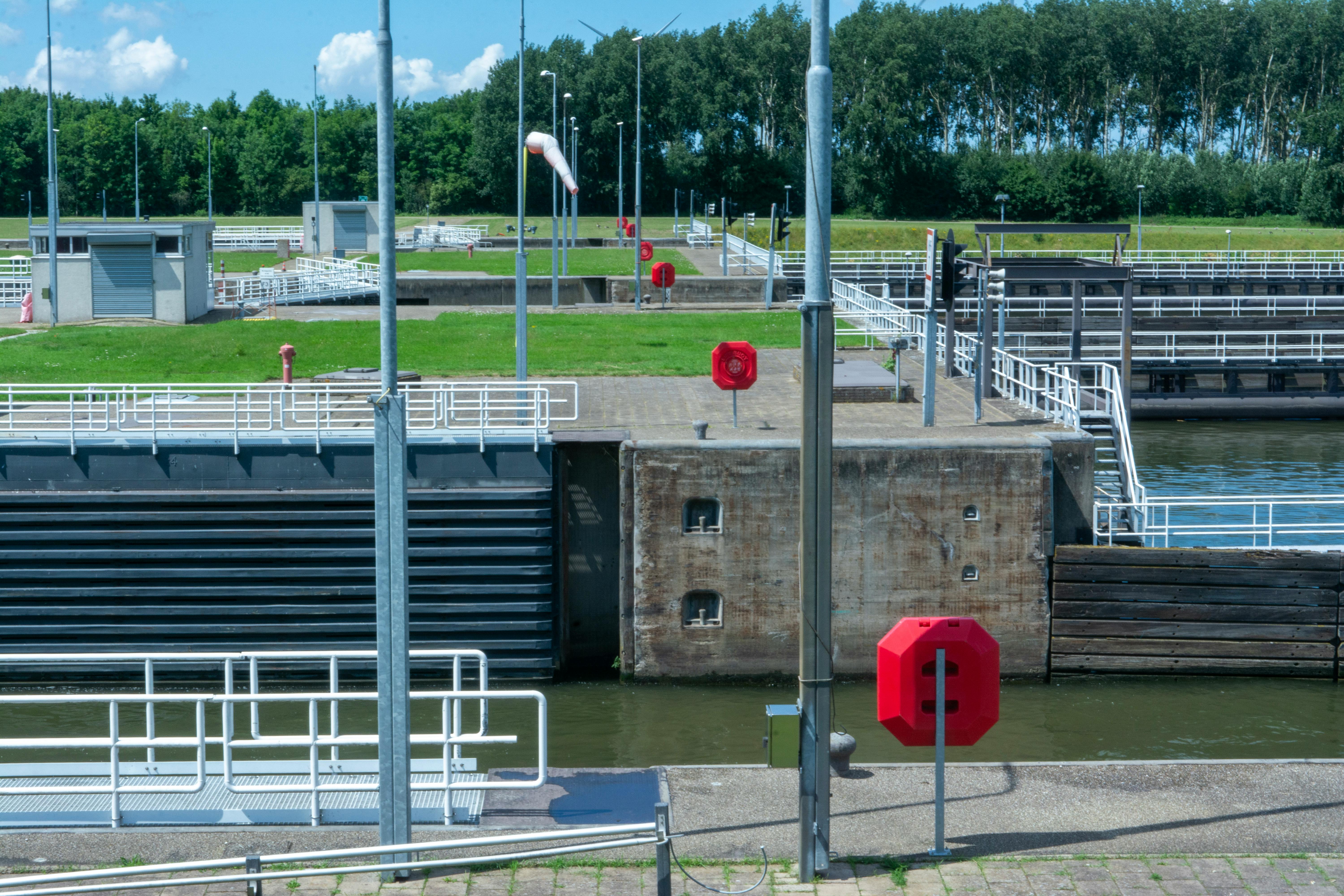 Modern Canal Lock System with Safety Features · Free Stock Photo