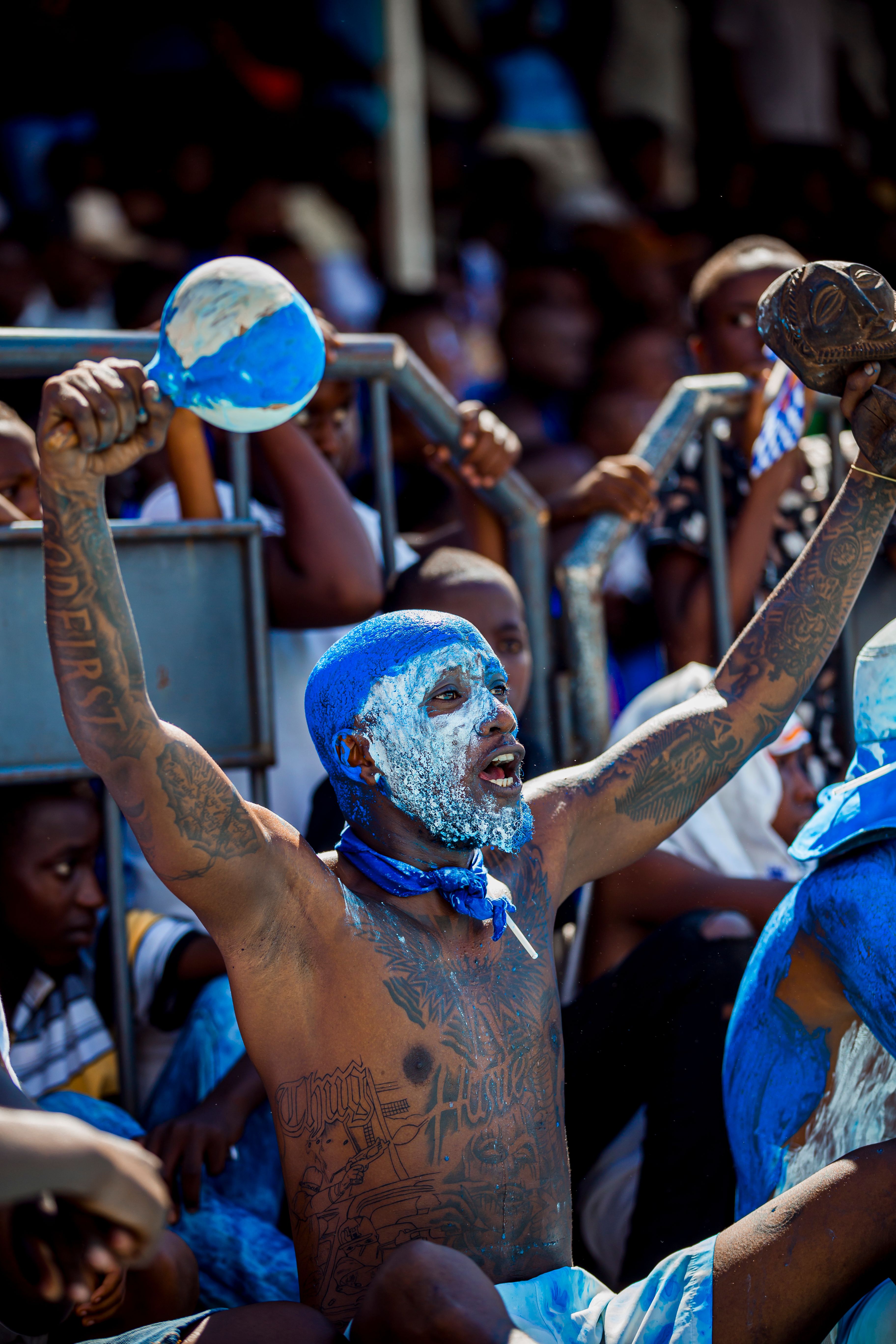 Excited Fans Celebrating at a Sports Event · Free Stock Photo
