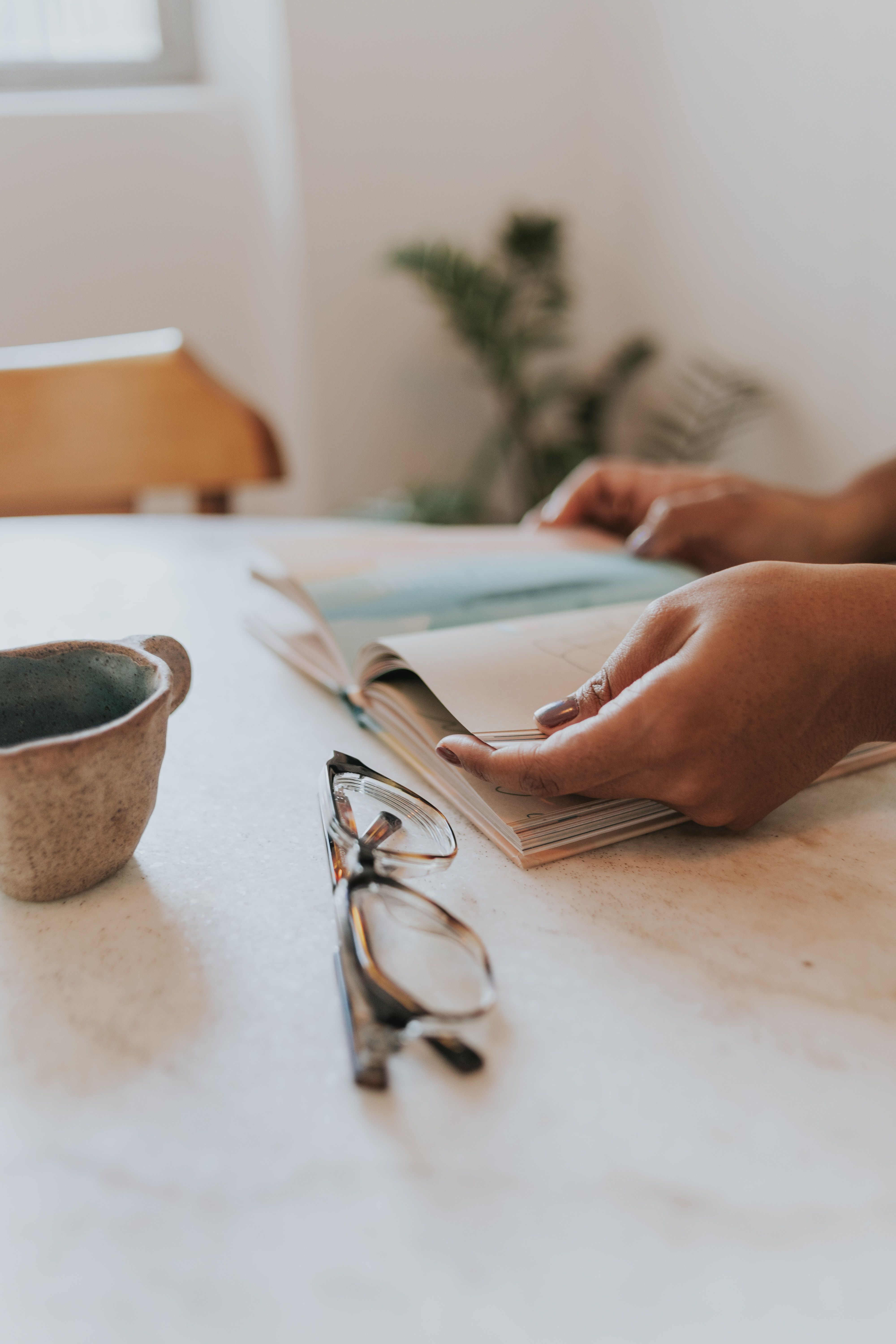 Cozy Morning Reading on Marble Table · Free Stock Photo
