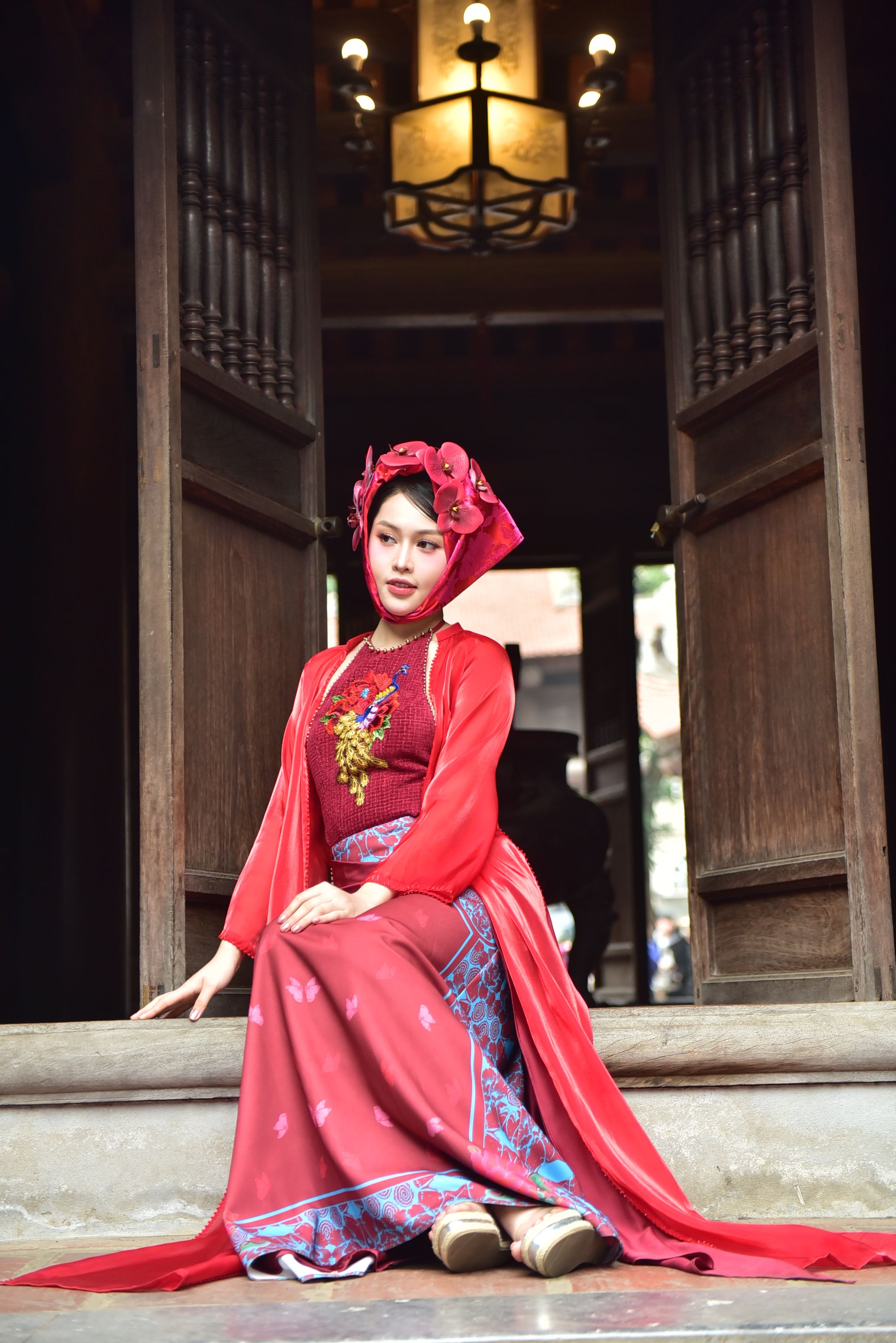 Elegant Traditional Dress in Cultural Setting · Free Stock Photo