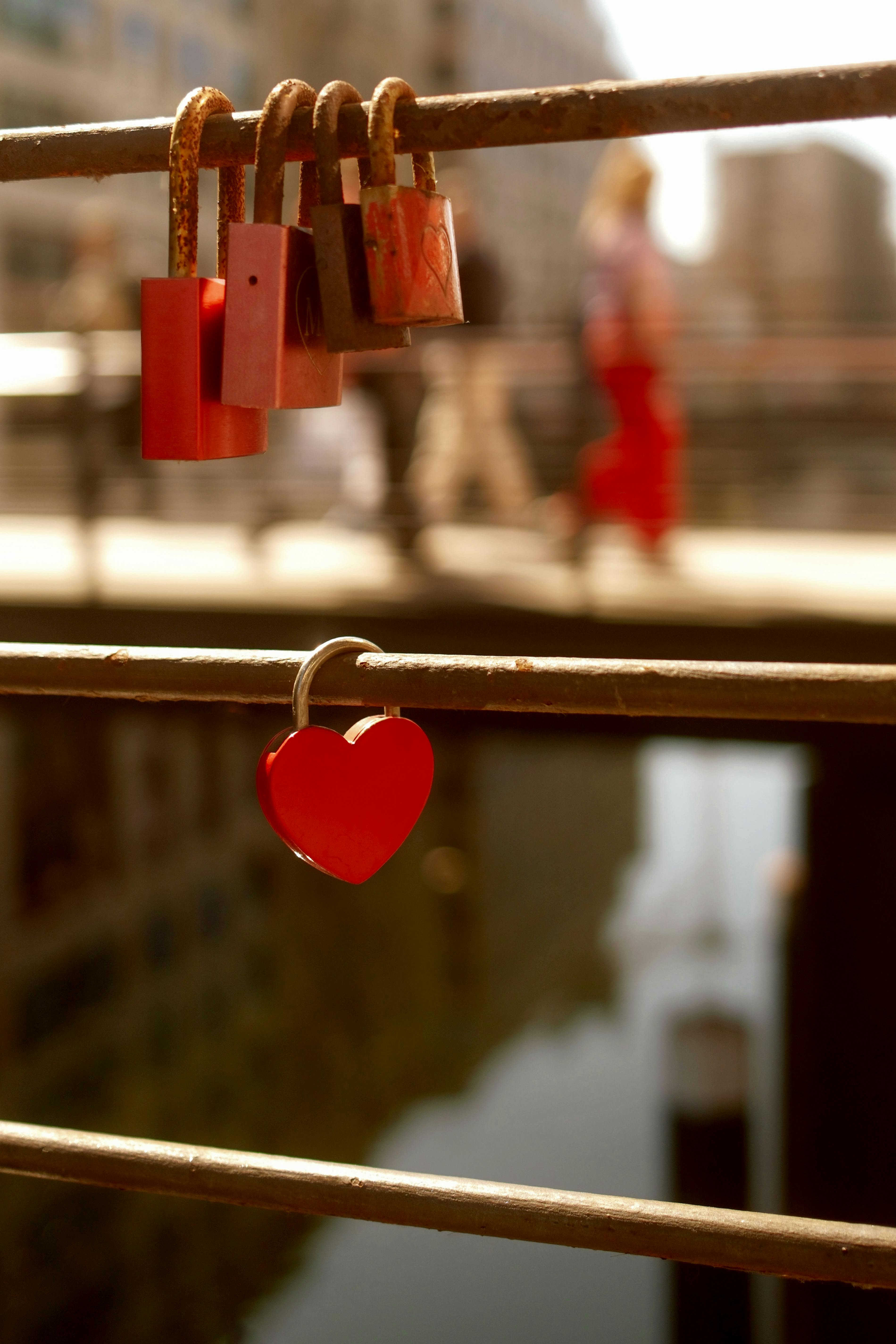 Red Heart Lock on Bridge with Blurred Background · Free Stock Photo