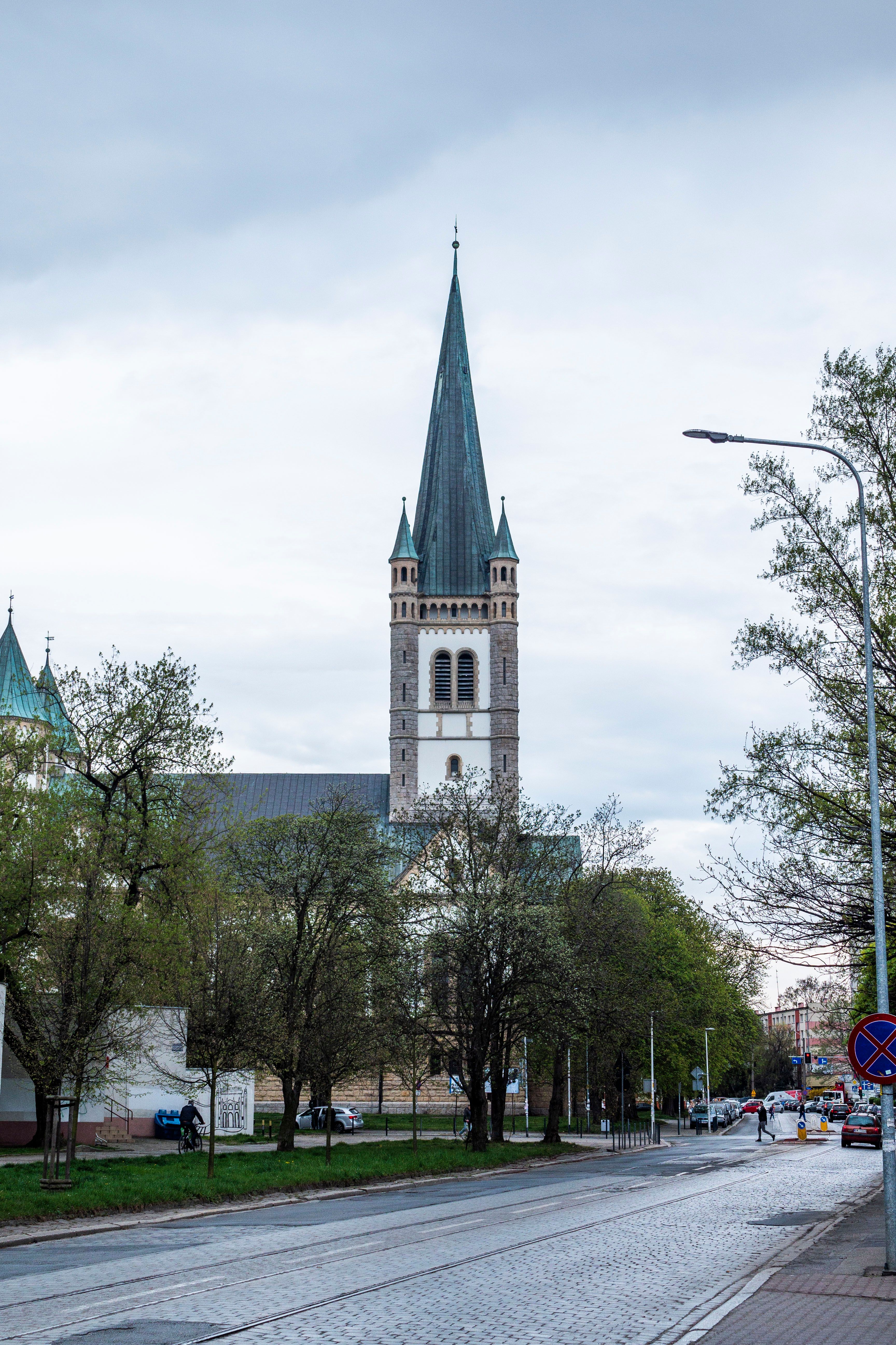 Historic Church Tower in Urban Street Scene · Free Stock Photo