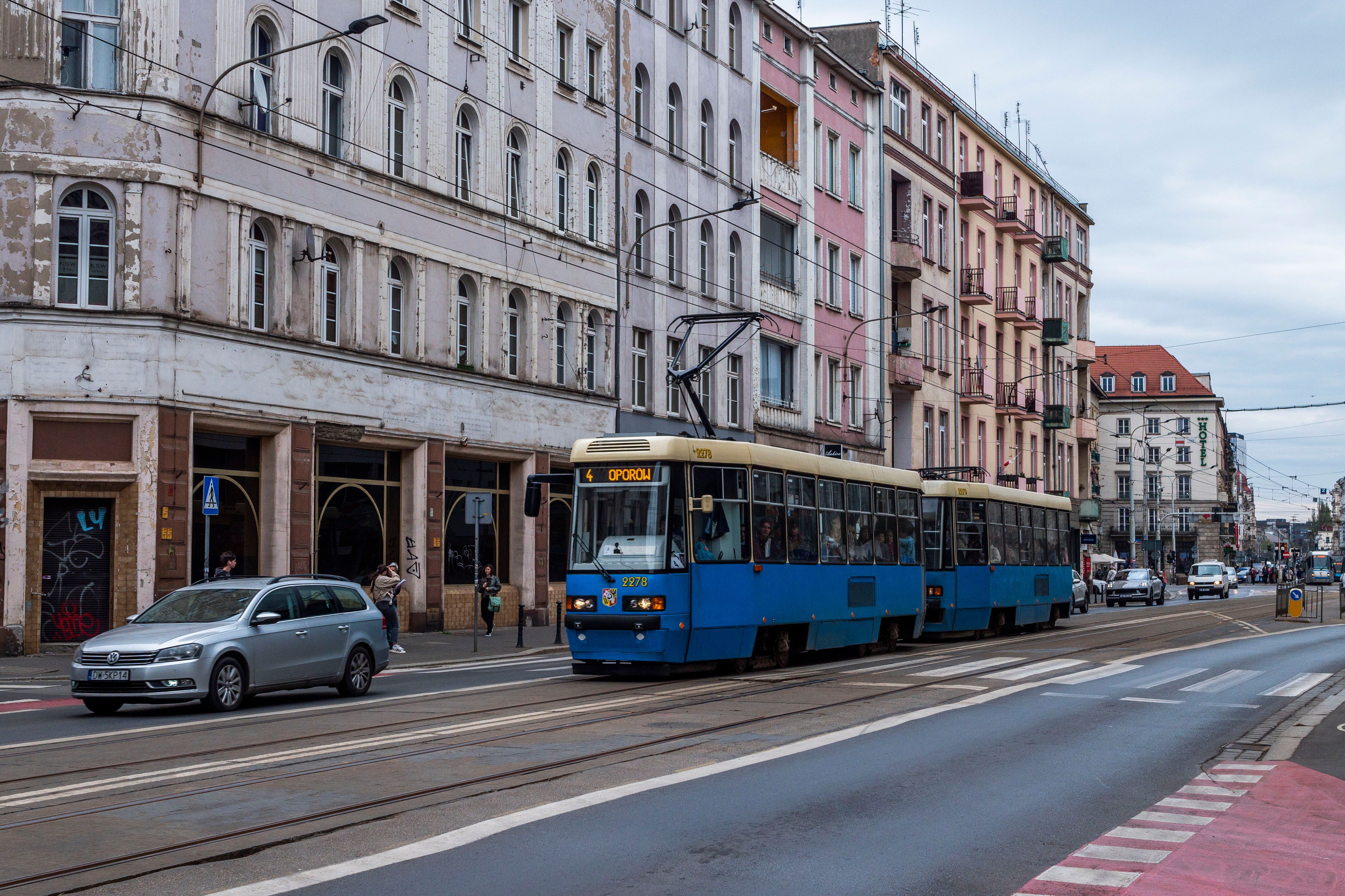 City Street with Tram in European Urban Setting · Free Stock Photo