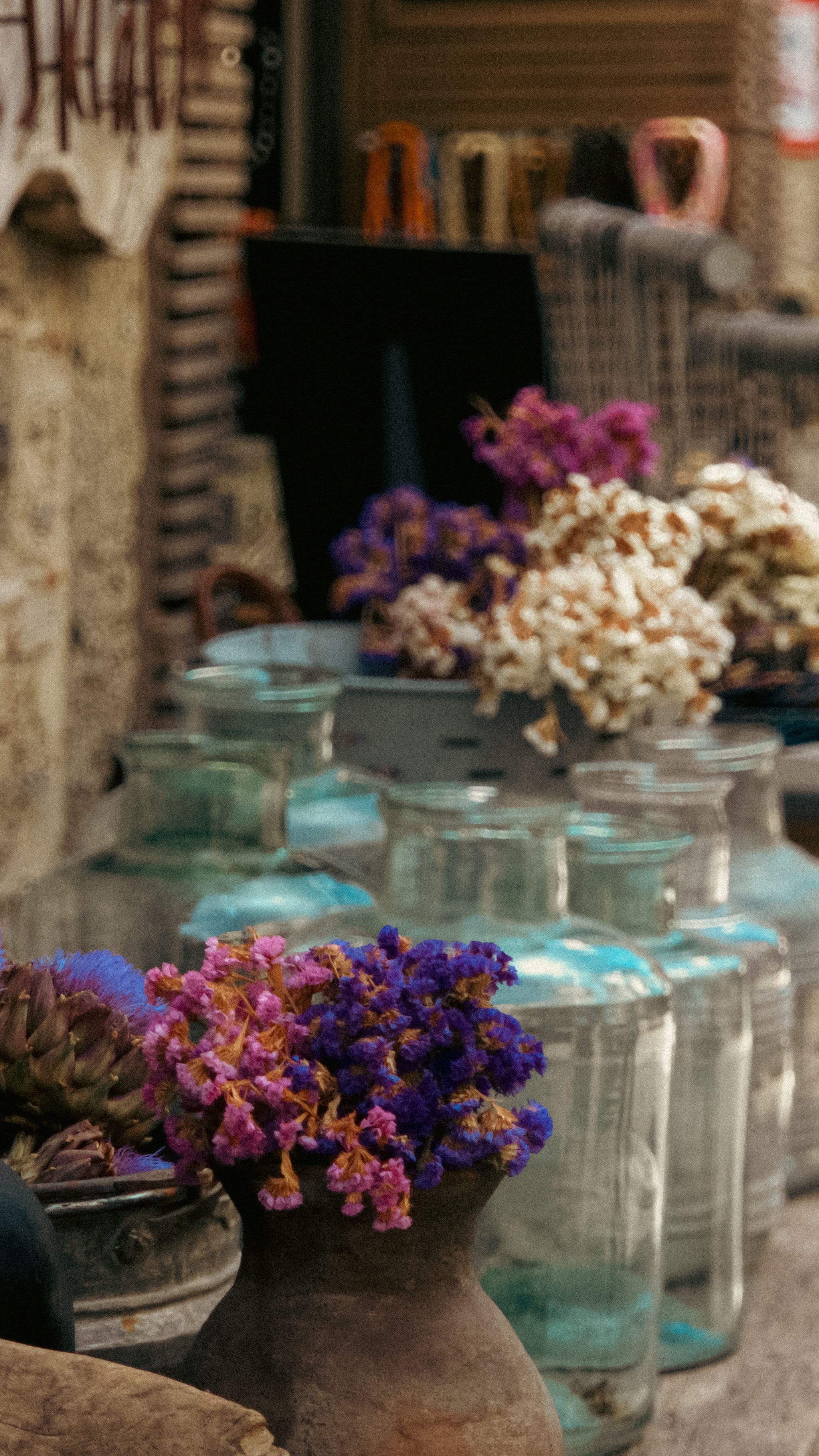 Rustic Floral Display with Vintage Glass Jars · Free Stock Photo