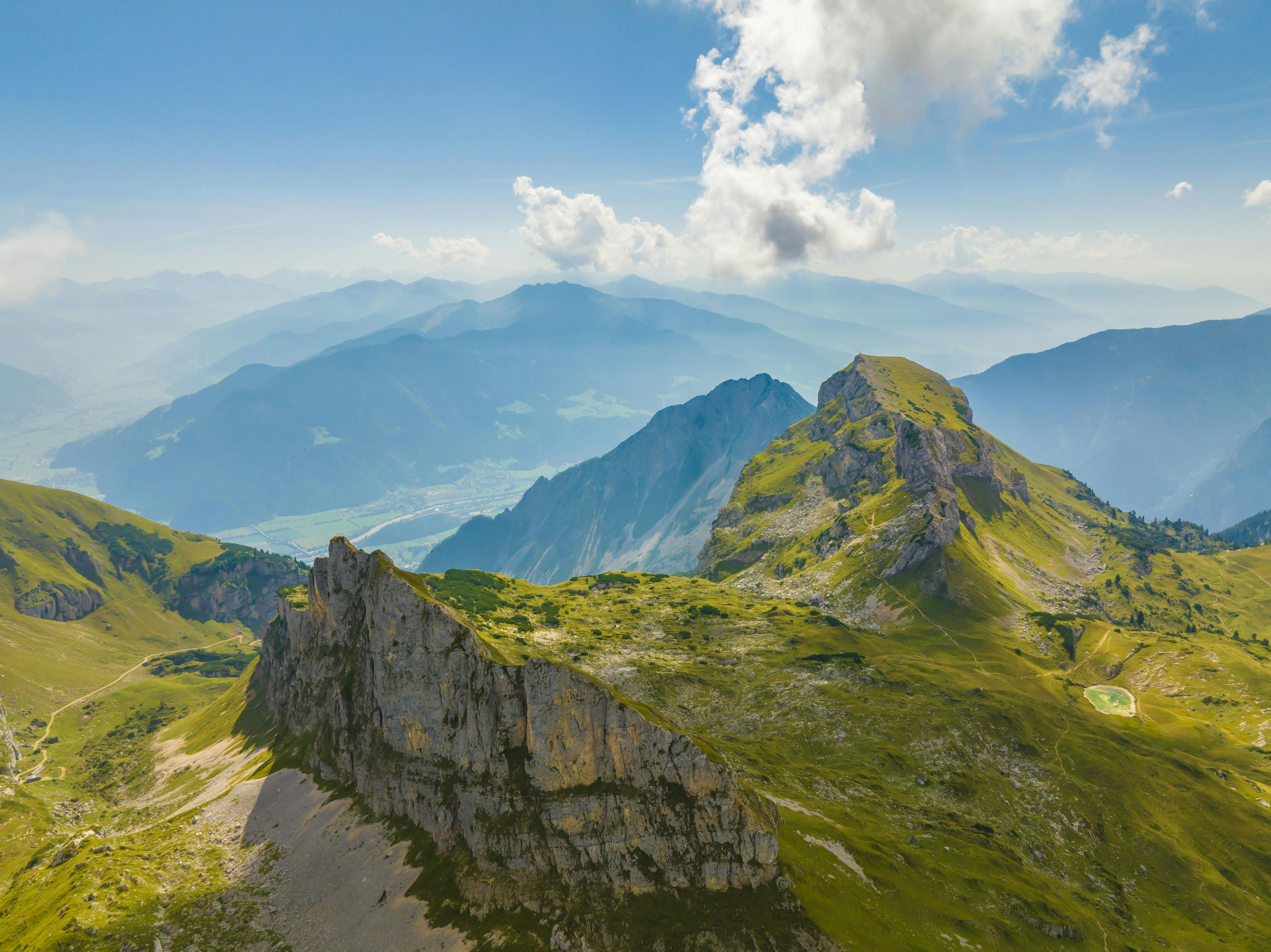 Aerial View of Scenic Alpine Mountain Range · Free Stock Photo