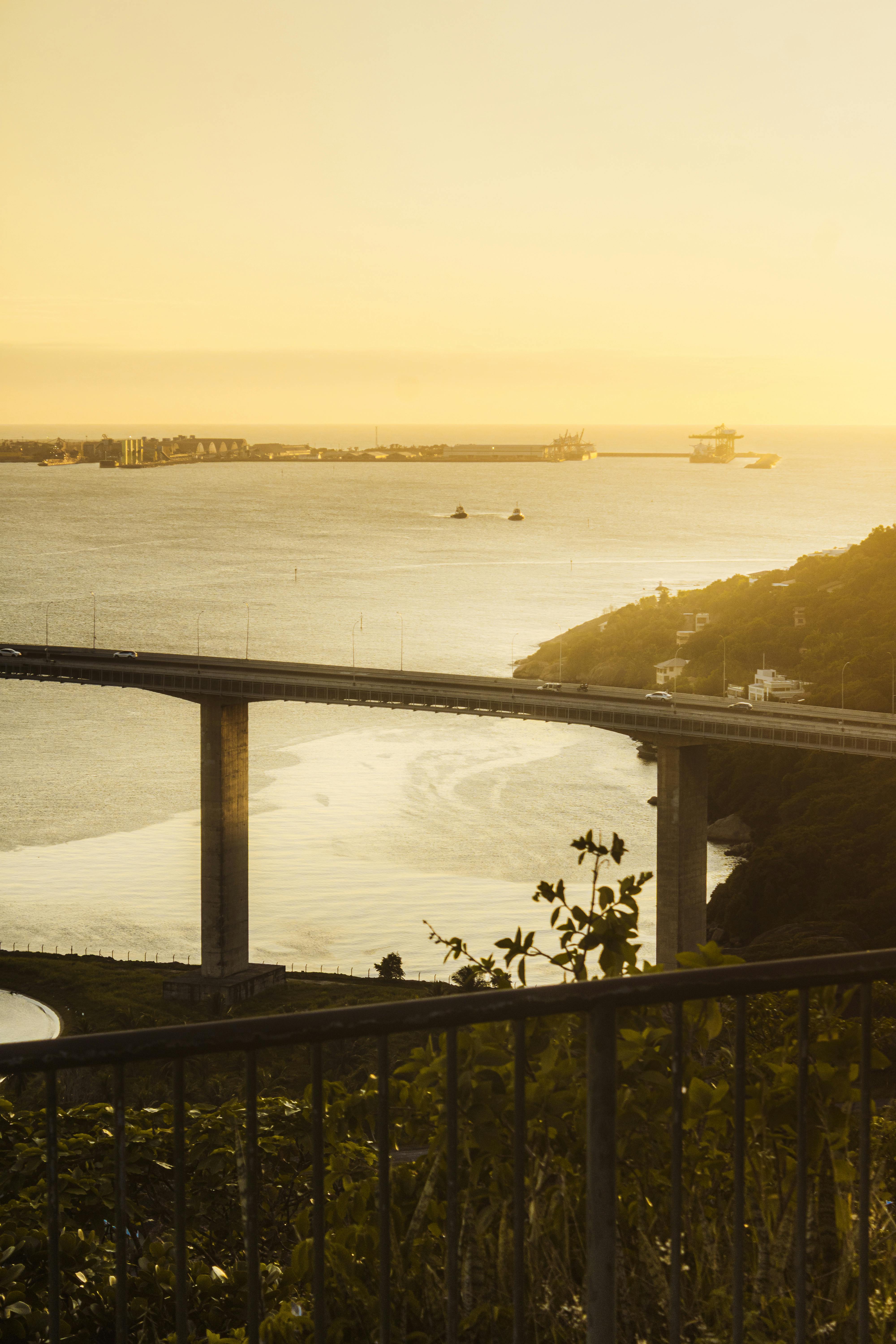 Golden Sunset Over Scenic Ocean View Bridge · Free Stock Photo