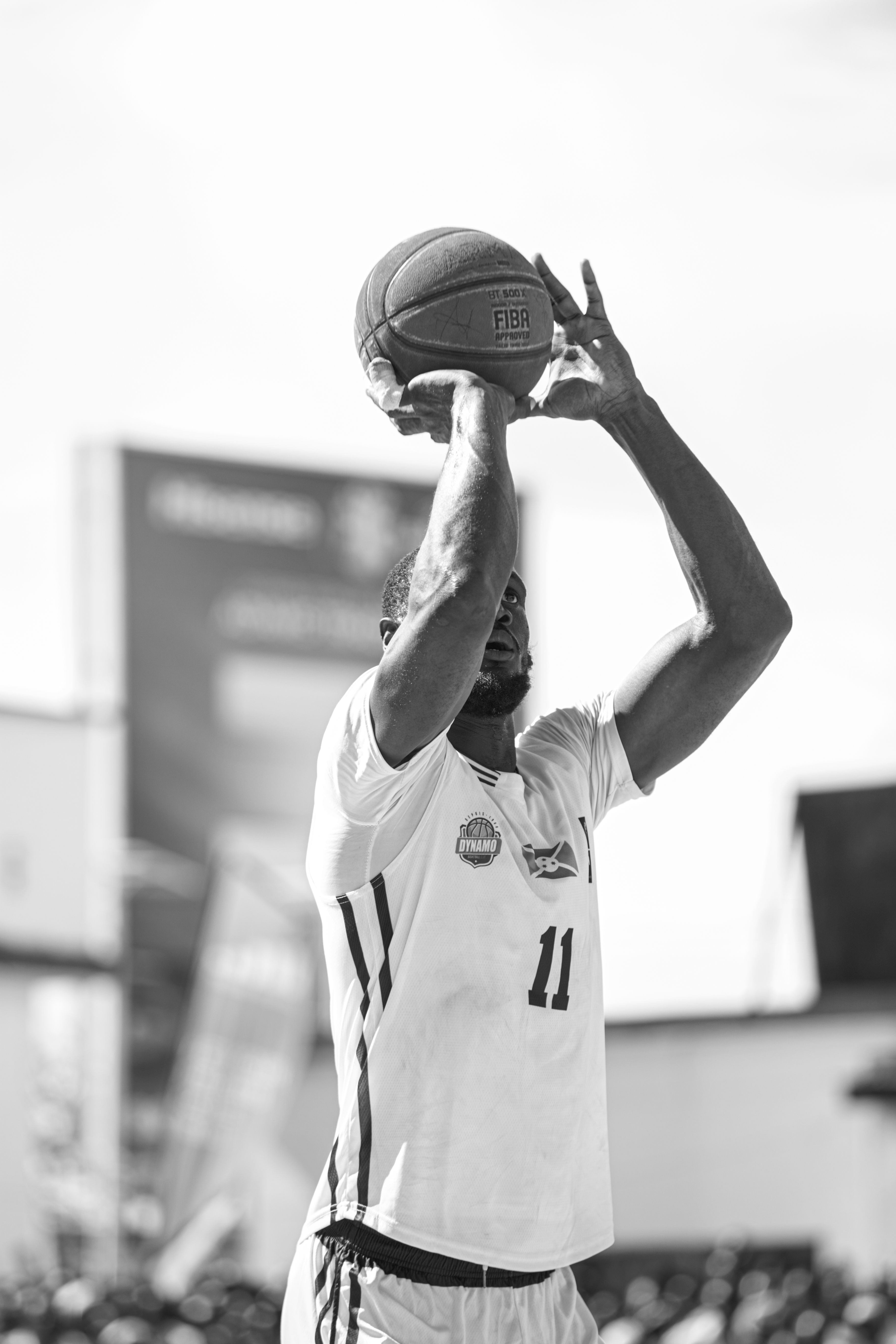 Dynamic Basketball Player Shooting in Action · Free Stock Photo