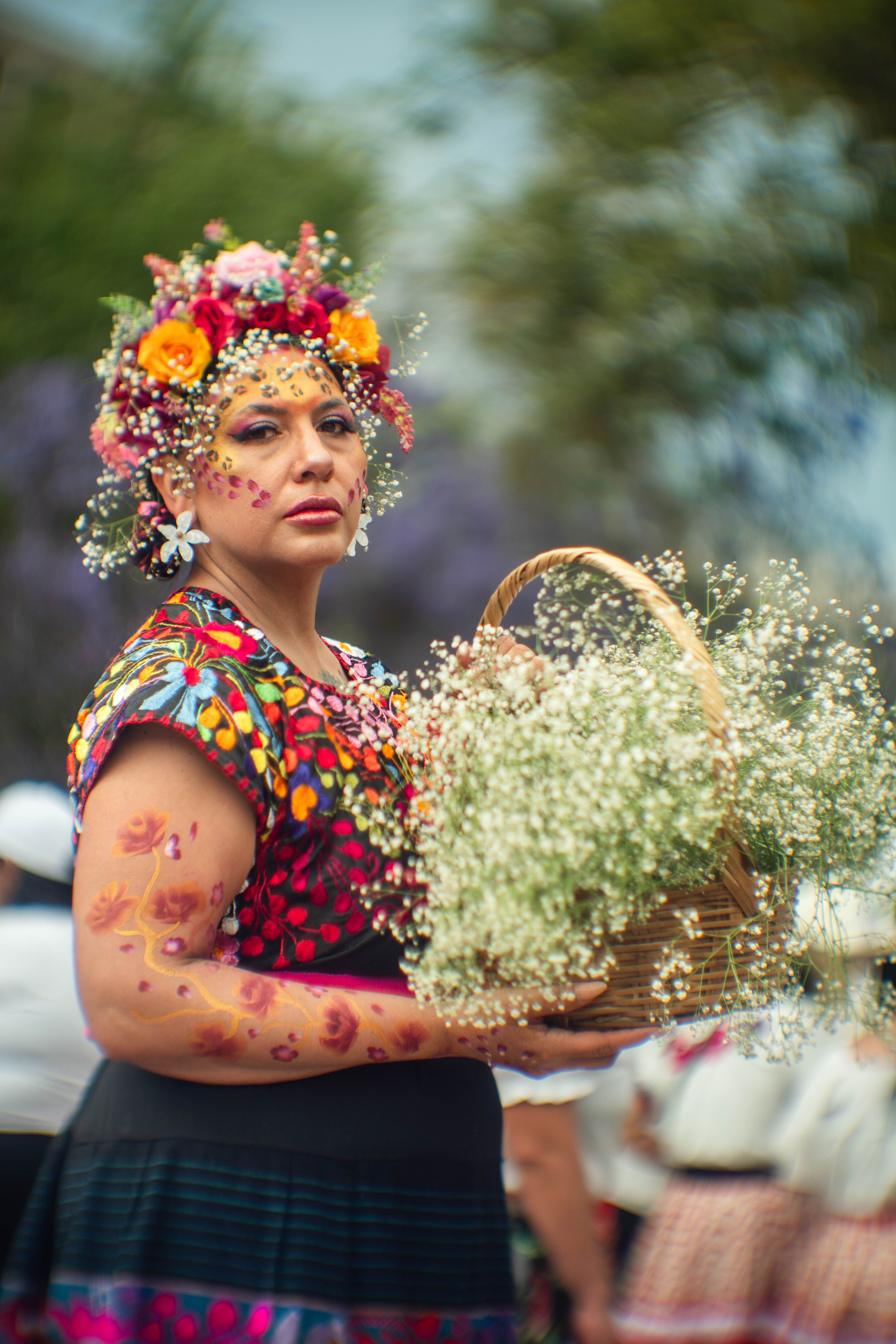 Woman in Traditional Floral Festival Attire · Free Stock Photo