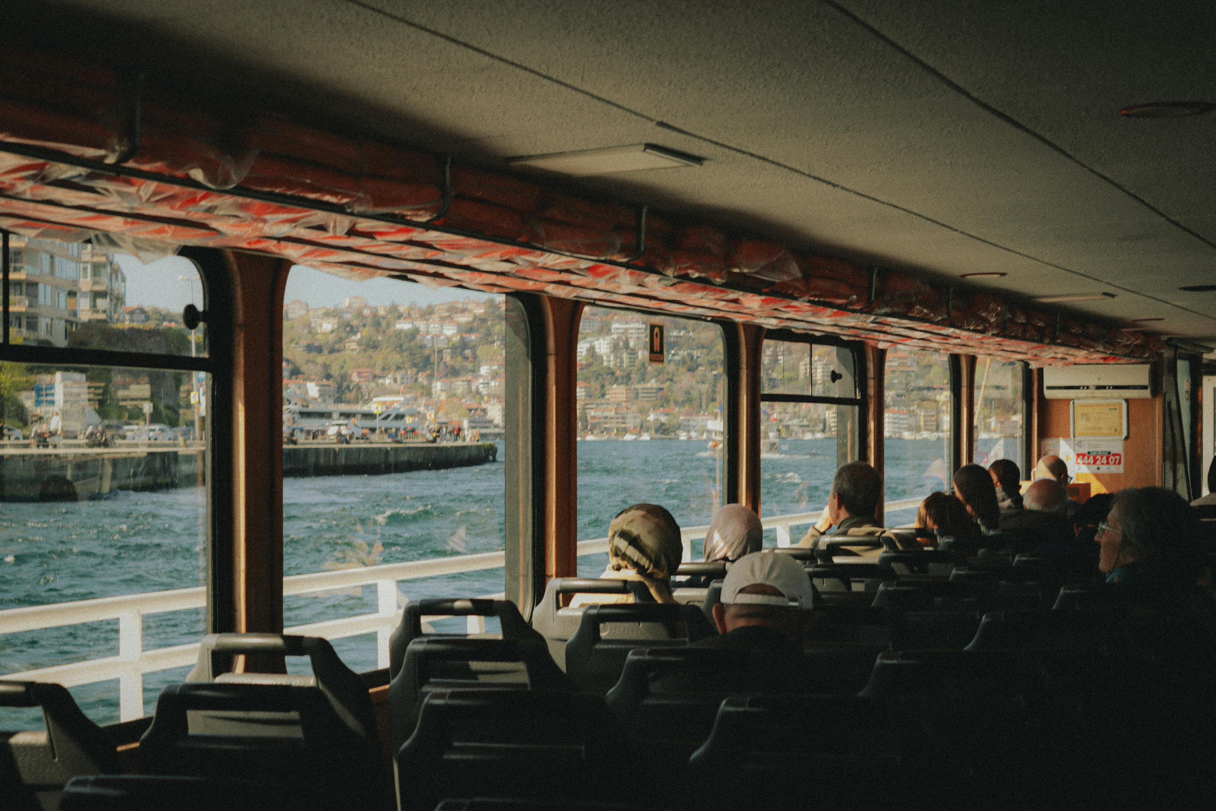 Scenic Ferry Ride with Passengers on Board · Free Stock Photo