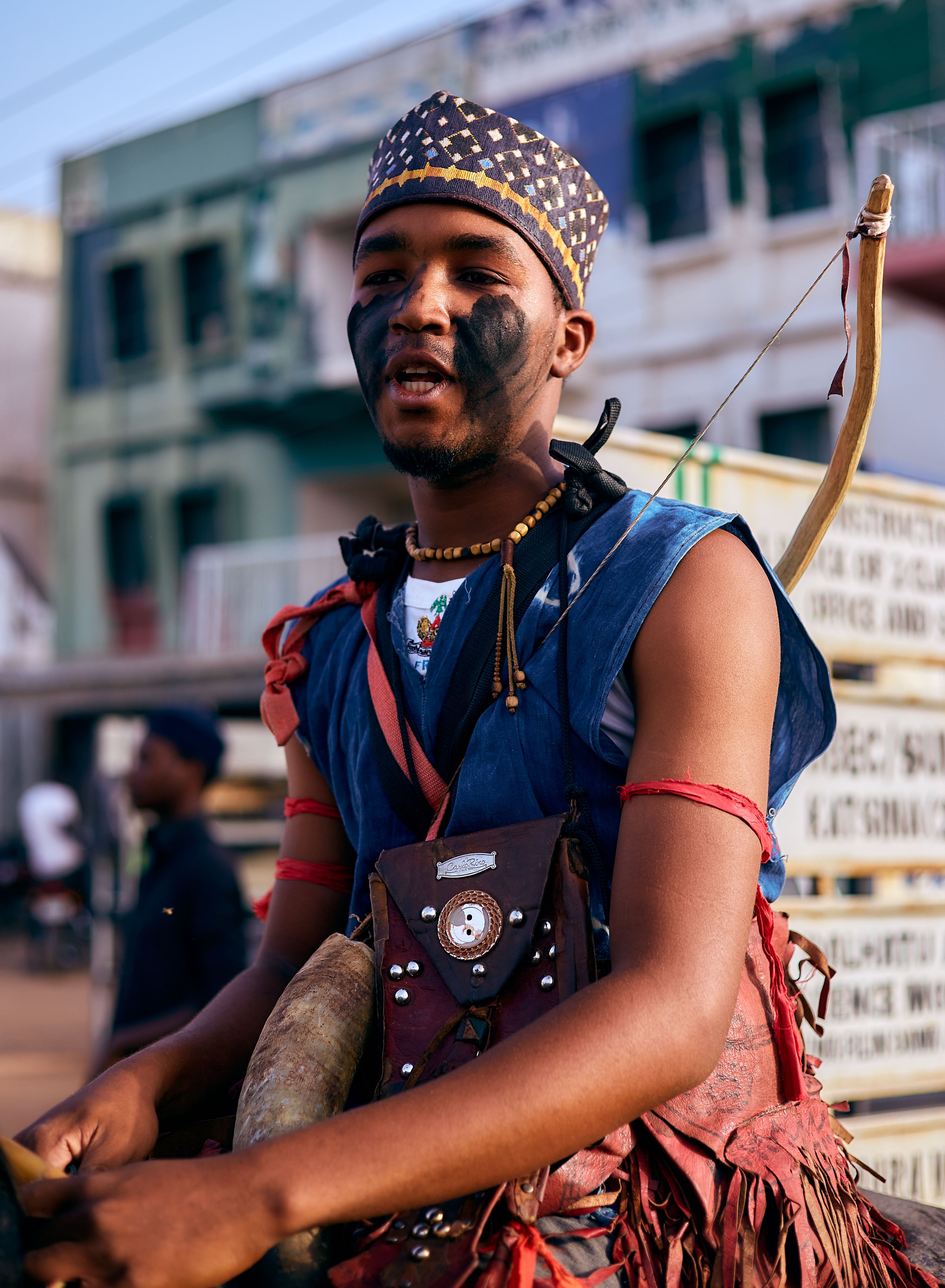 Colorful Traditional Performer in Festival Setting · Free Stock Photo