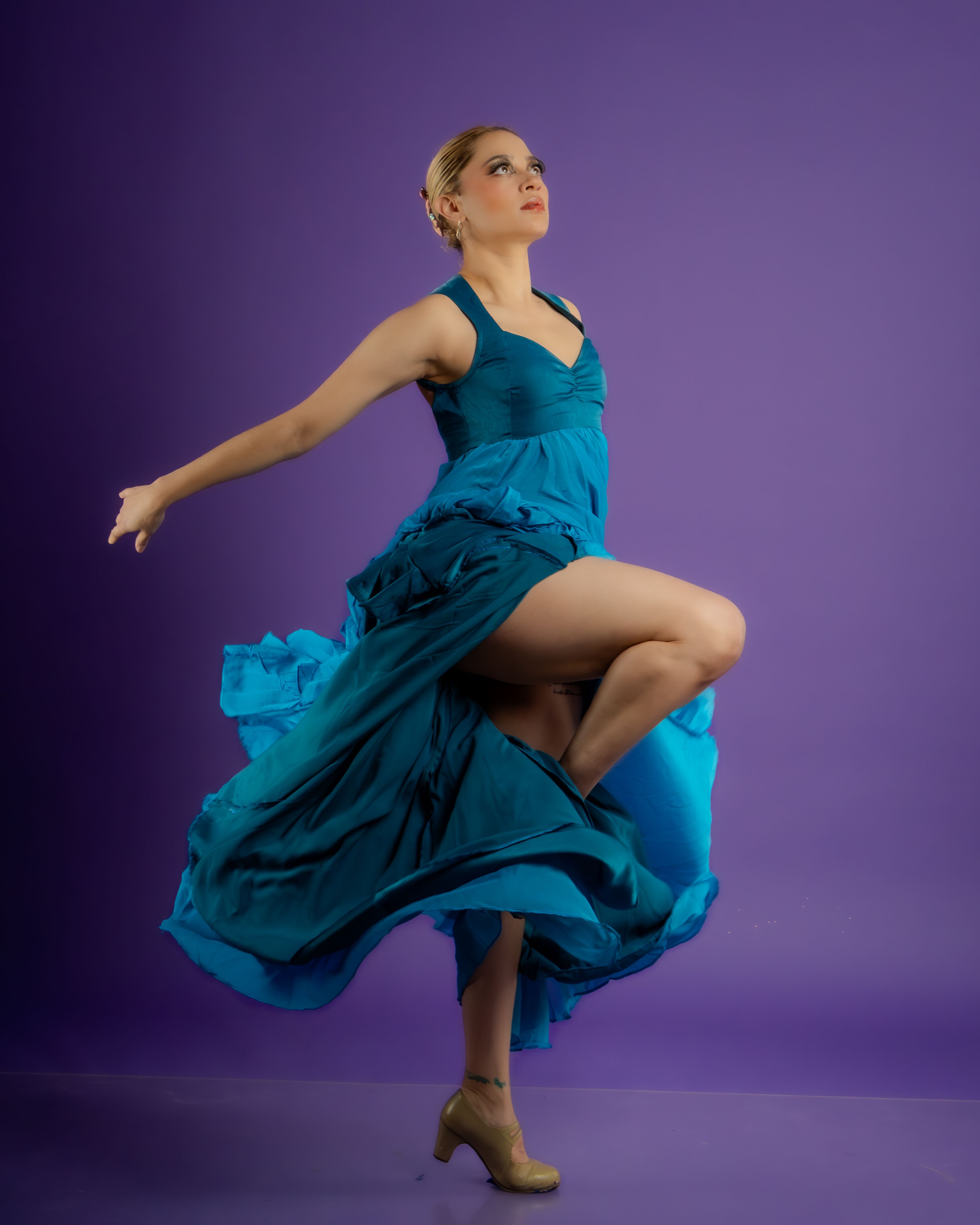Elegant Contemporary Dance Portrait on Purple Background · Free Stock Photo