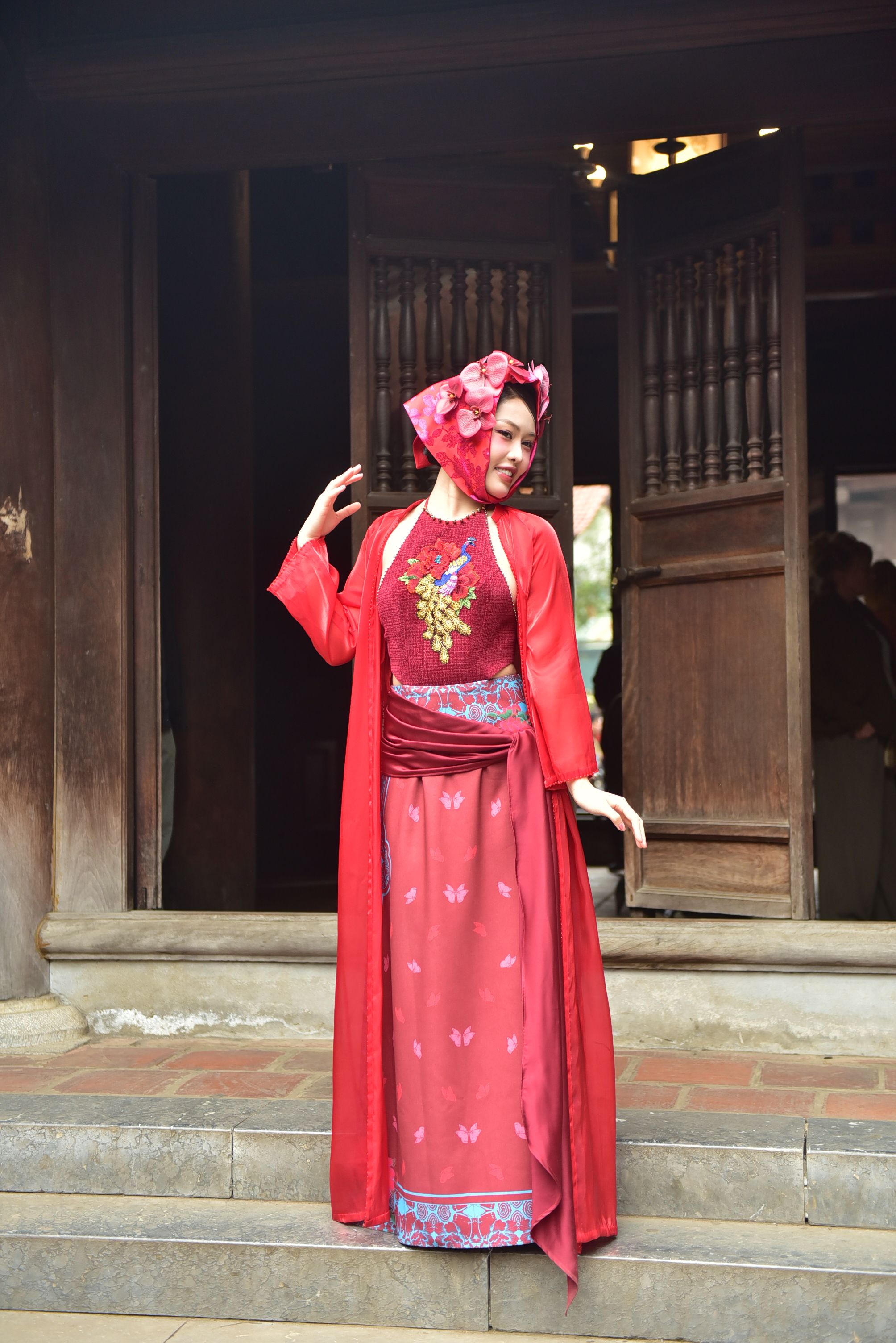 Traditional Asian Attire Portrait at Doorway · Free Stock Photo