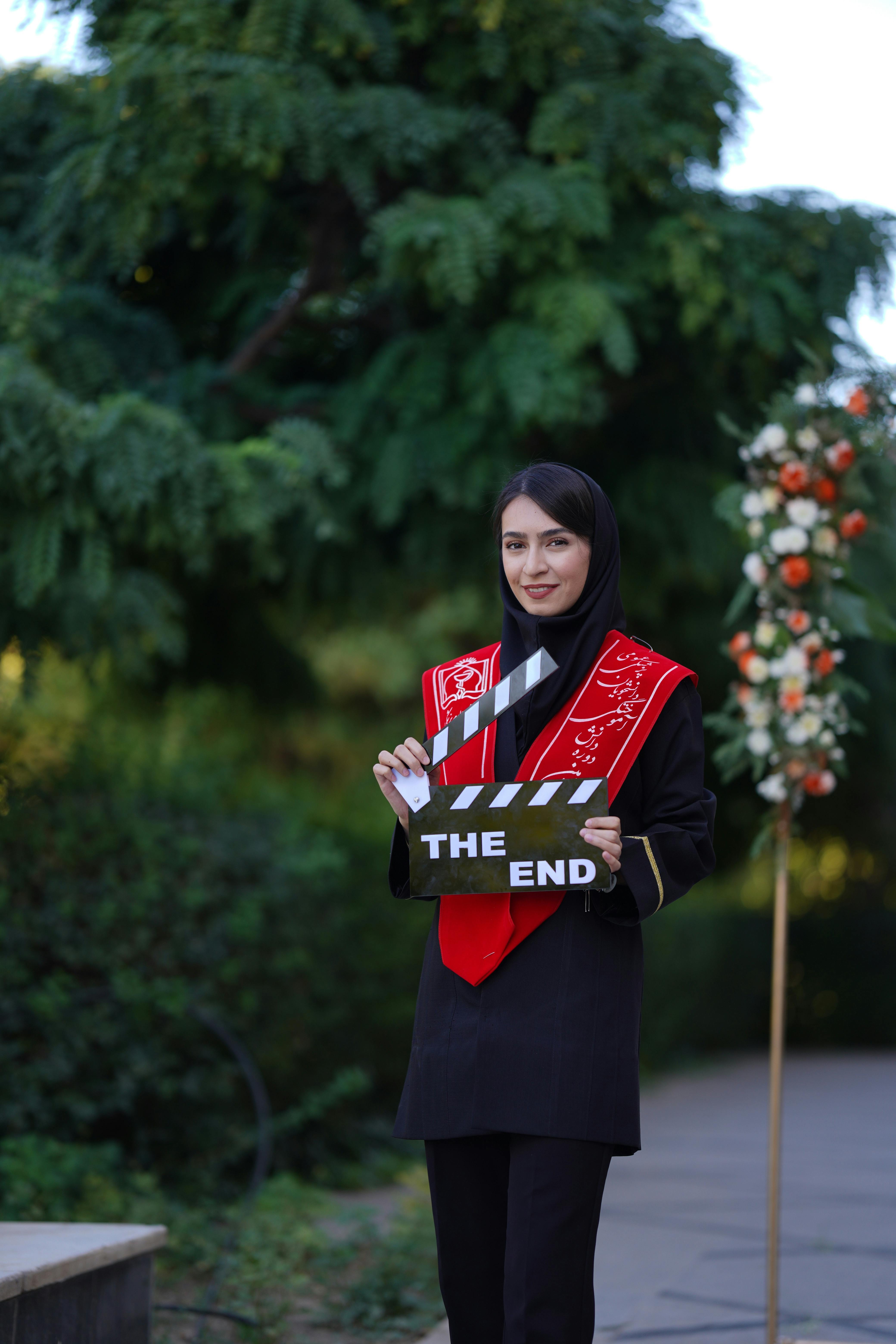 Graduation Celebration with Clapperboard in Iran · Free Stock Photo