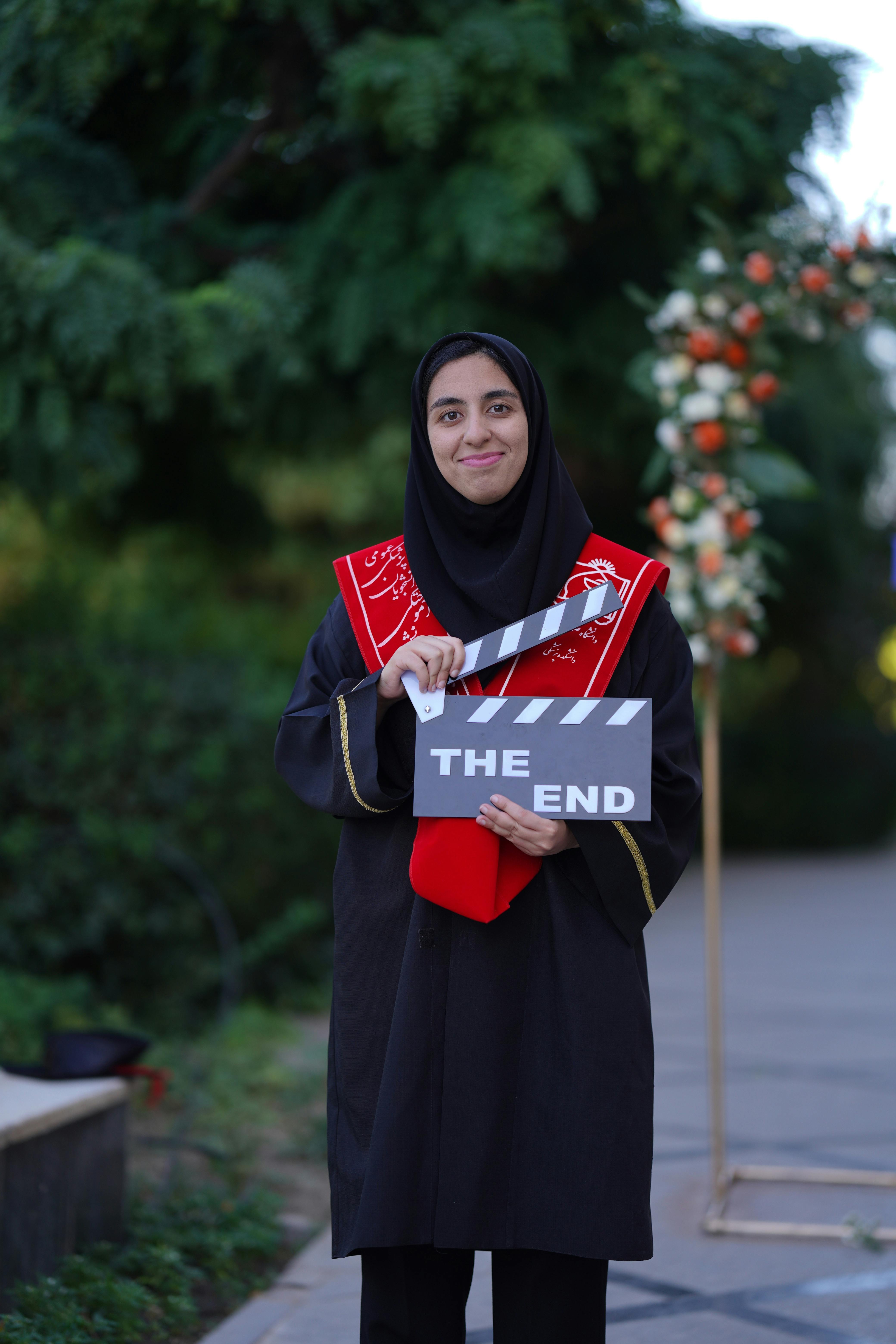 Middle Eastern Graduation Ceremony with Clapperboard · Free Stock Photo