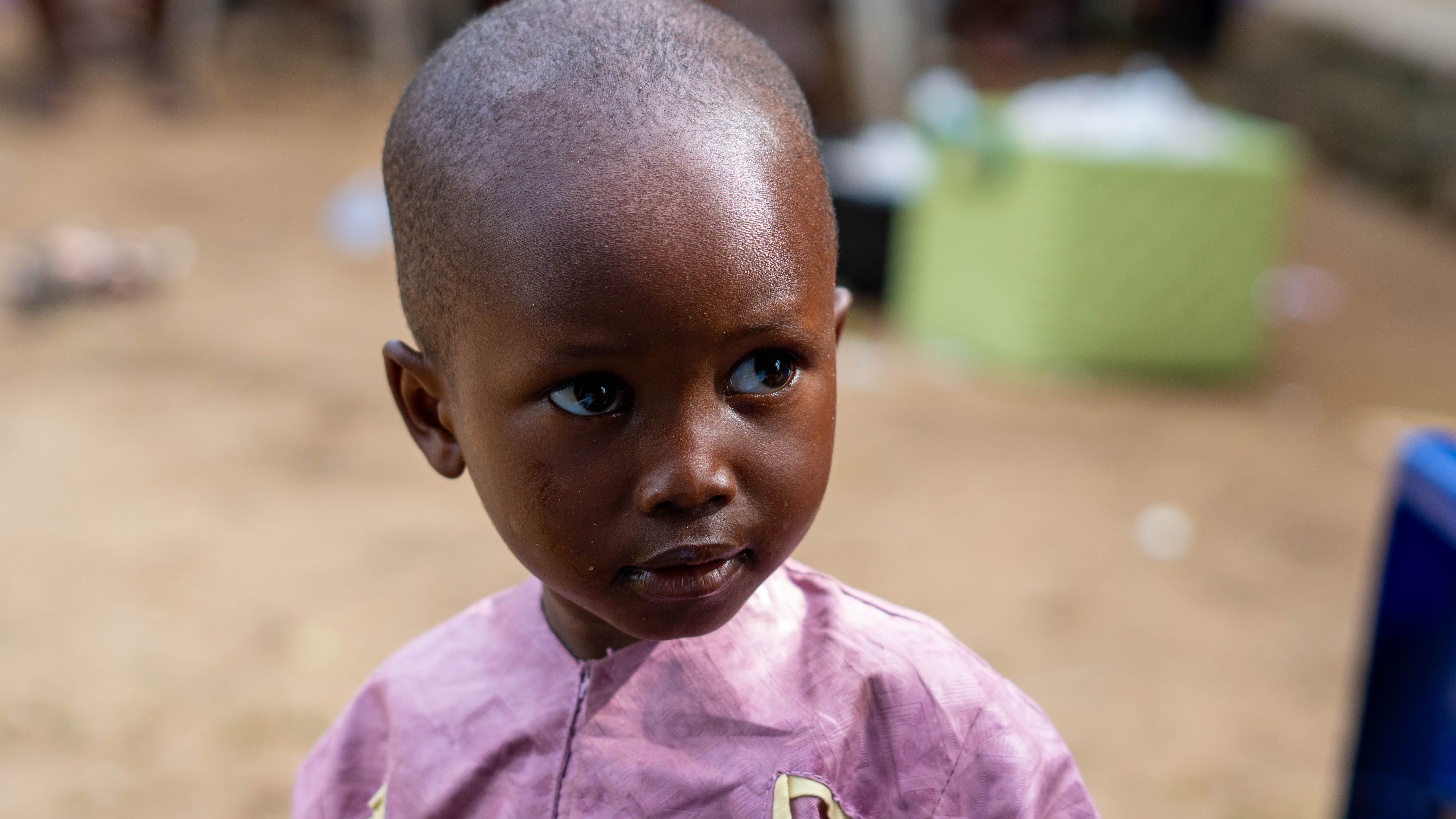 Charming Portrait of a Young African Boy Outdoors · Free Stock Photo