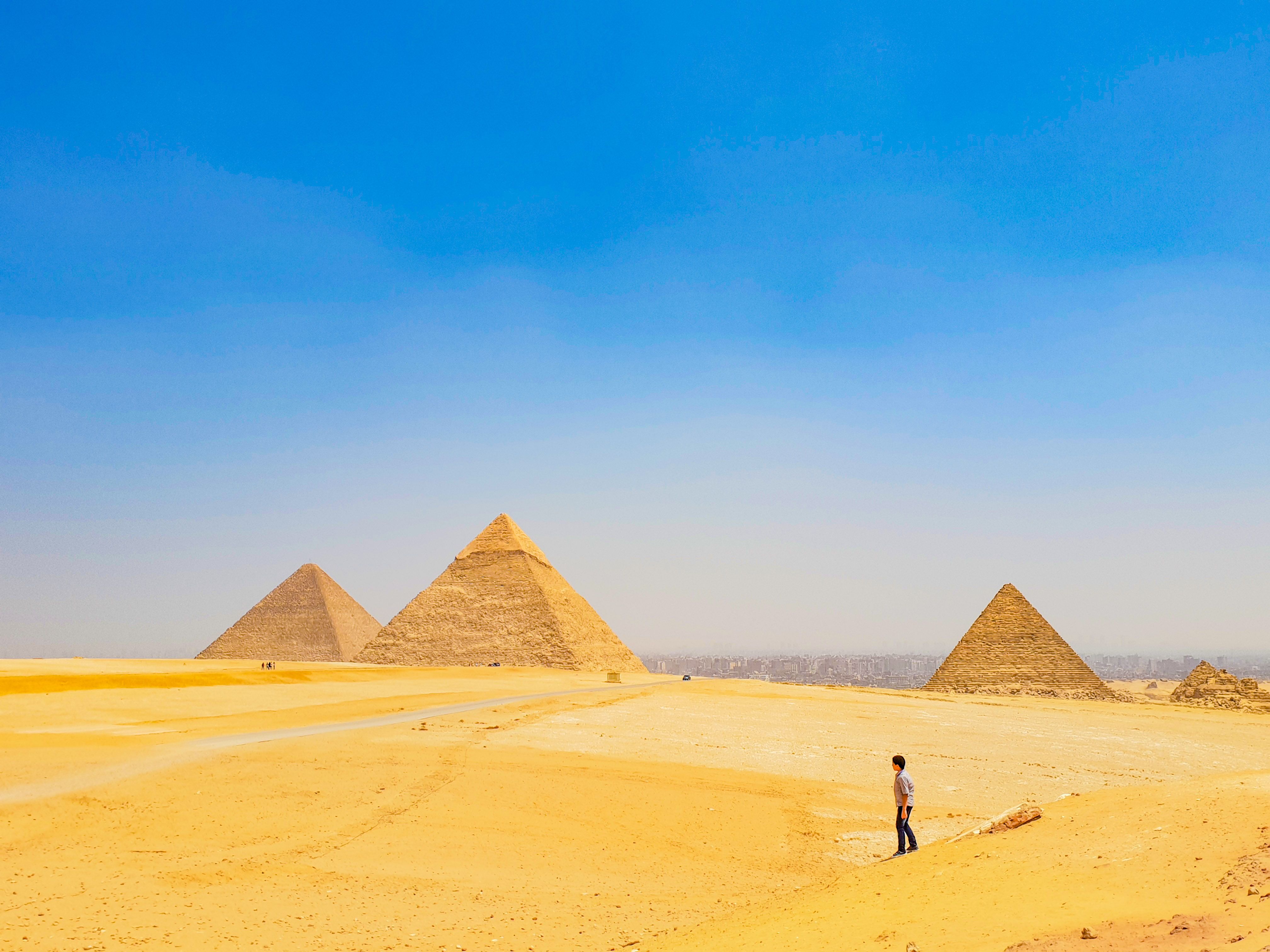 Man Taking Photo of the Great Pyramid · Free Stock Photo