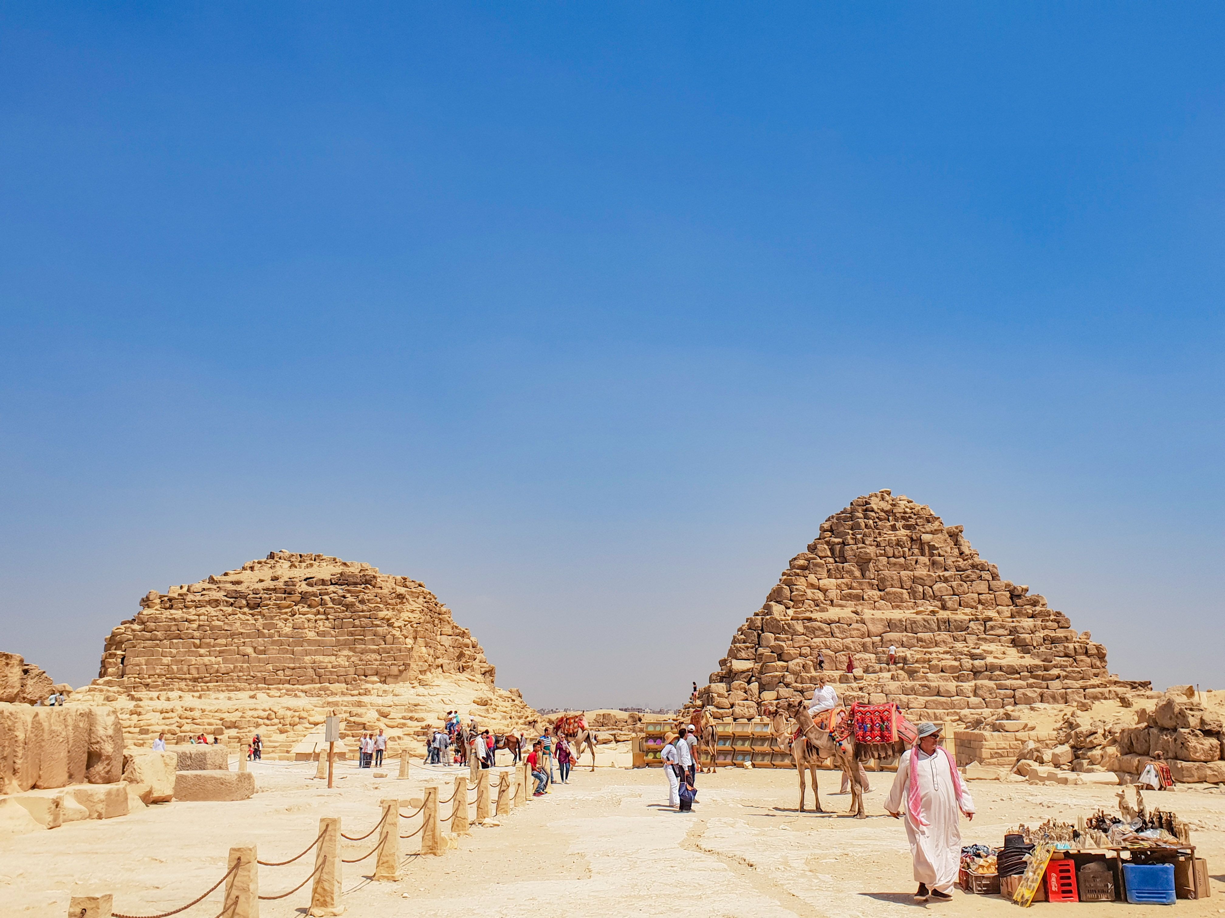 Tourists Exploring the Pyramids of Giza in Egypt · Free Stock Photo