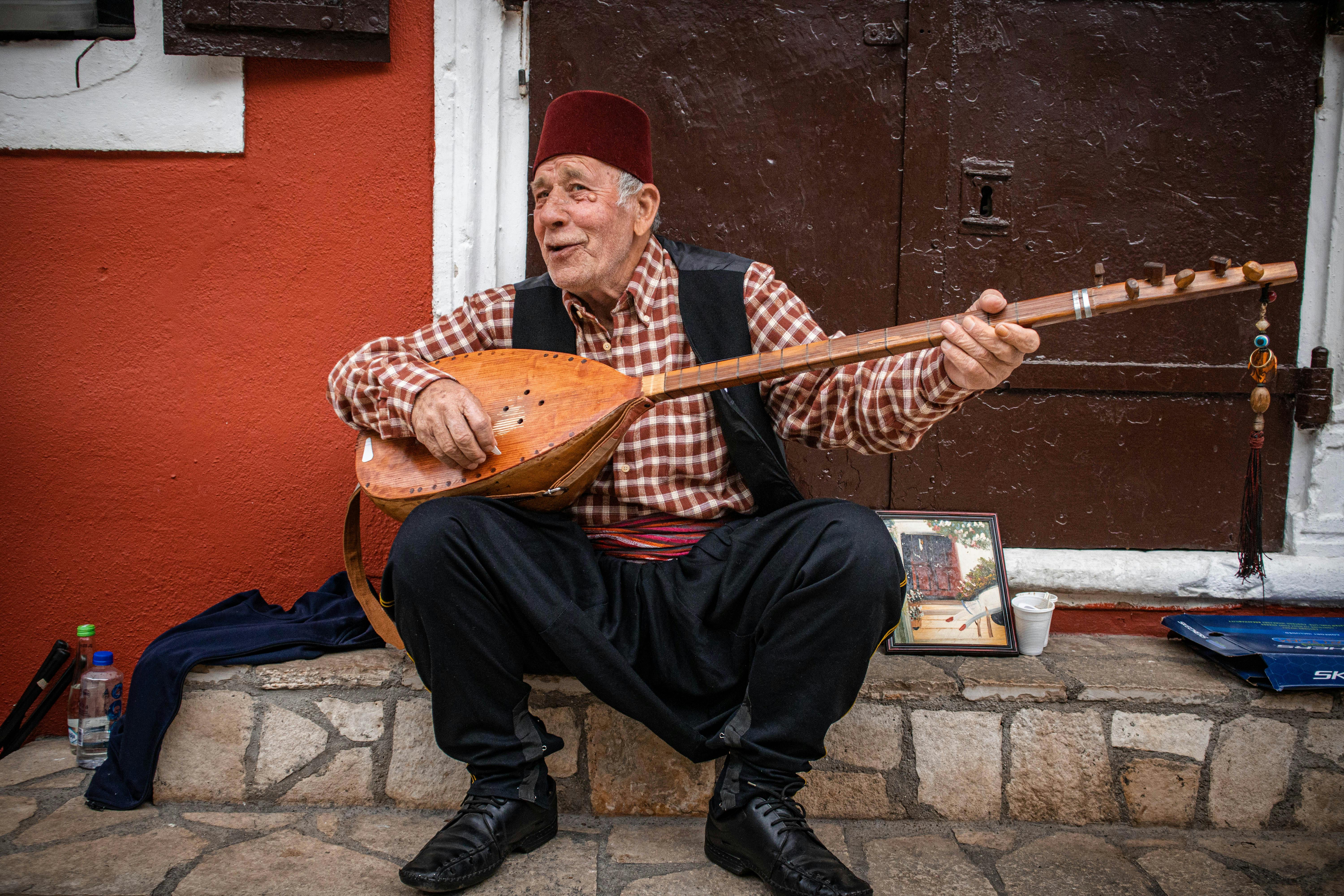 Traditional Bosnian Musician Playing Saz in Mostar · Free Stock Photo