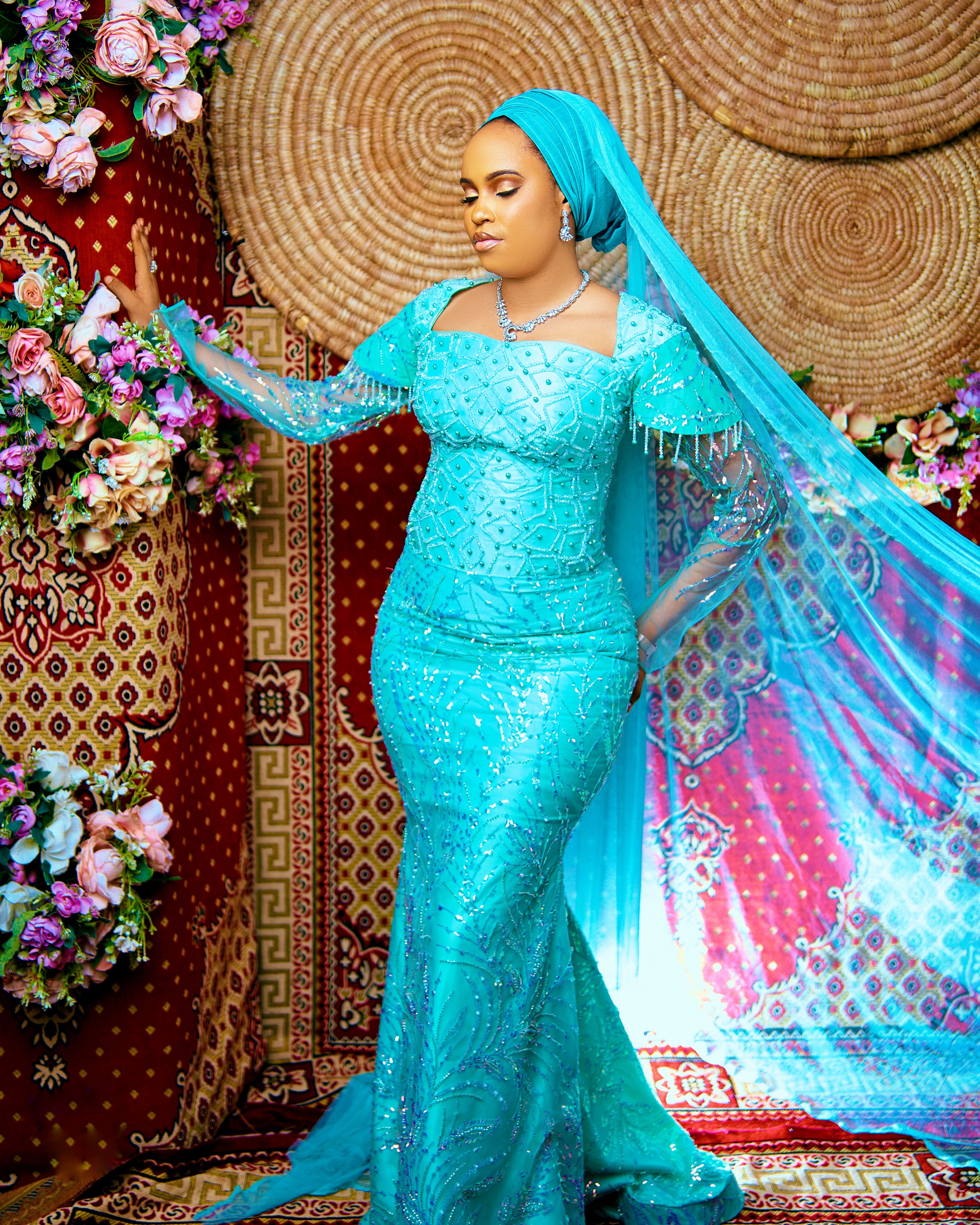 Elegant Woman in Blue Traditional Gown · Free Stock Photo