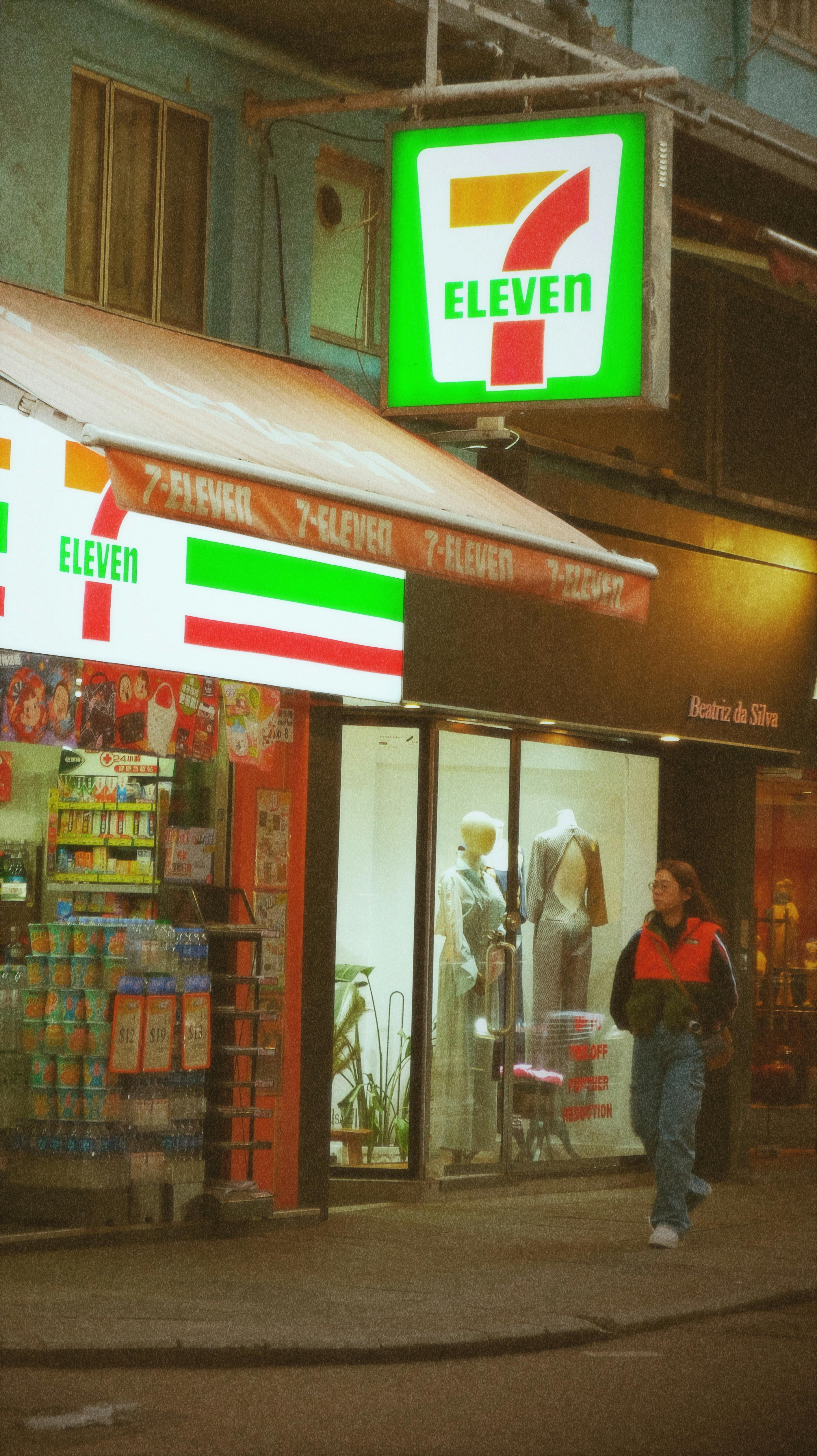 Urban Scene with 7-Eleven Storefront at Night · Free Stock Photo