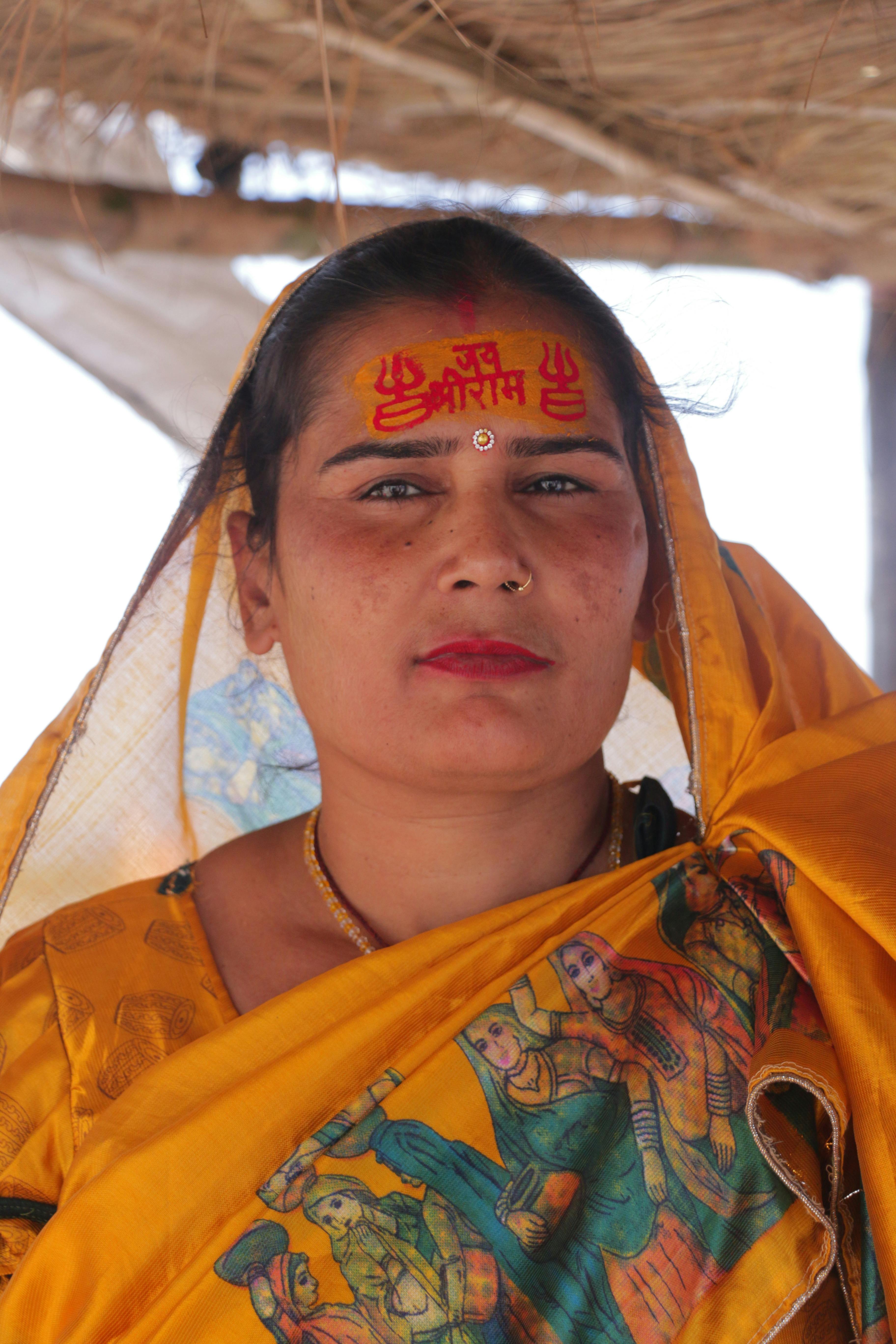 Traditional Indian Woman in Vibrant Saree · Free Stock Photo