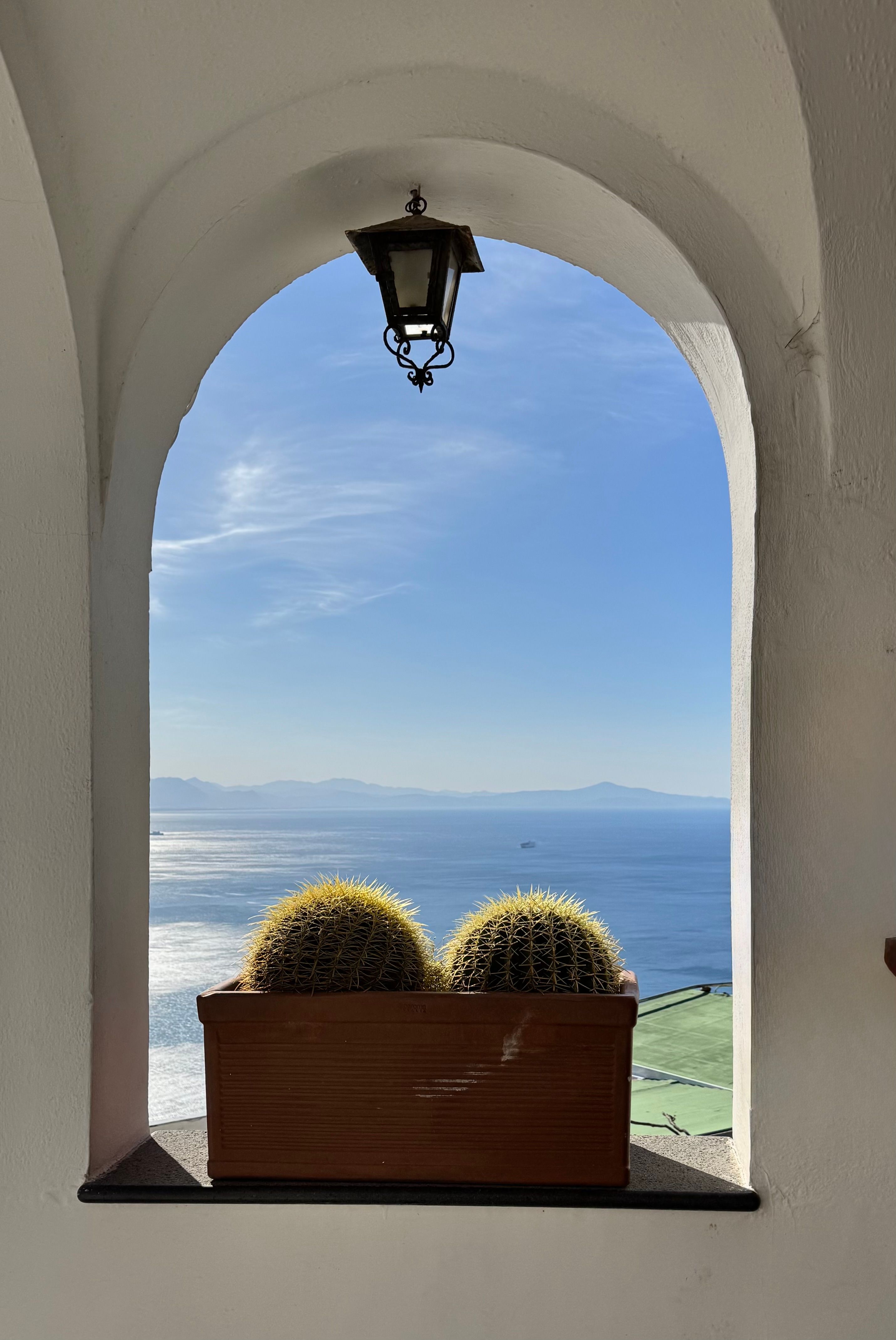 Scenic Mediterranean Sea View from Arched Window · Free Stock Photo