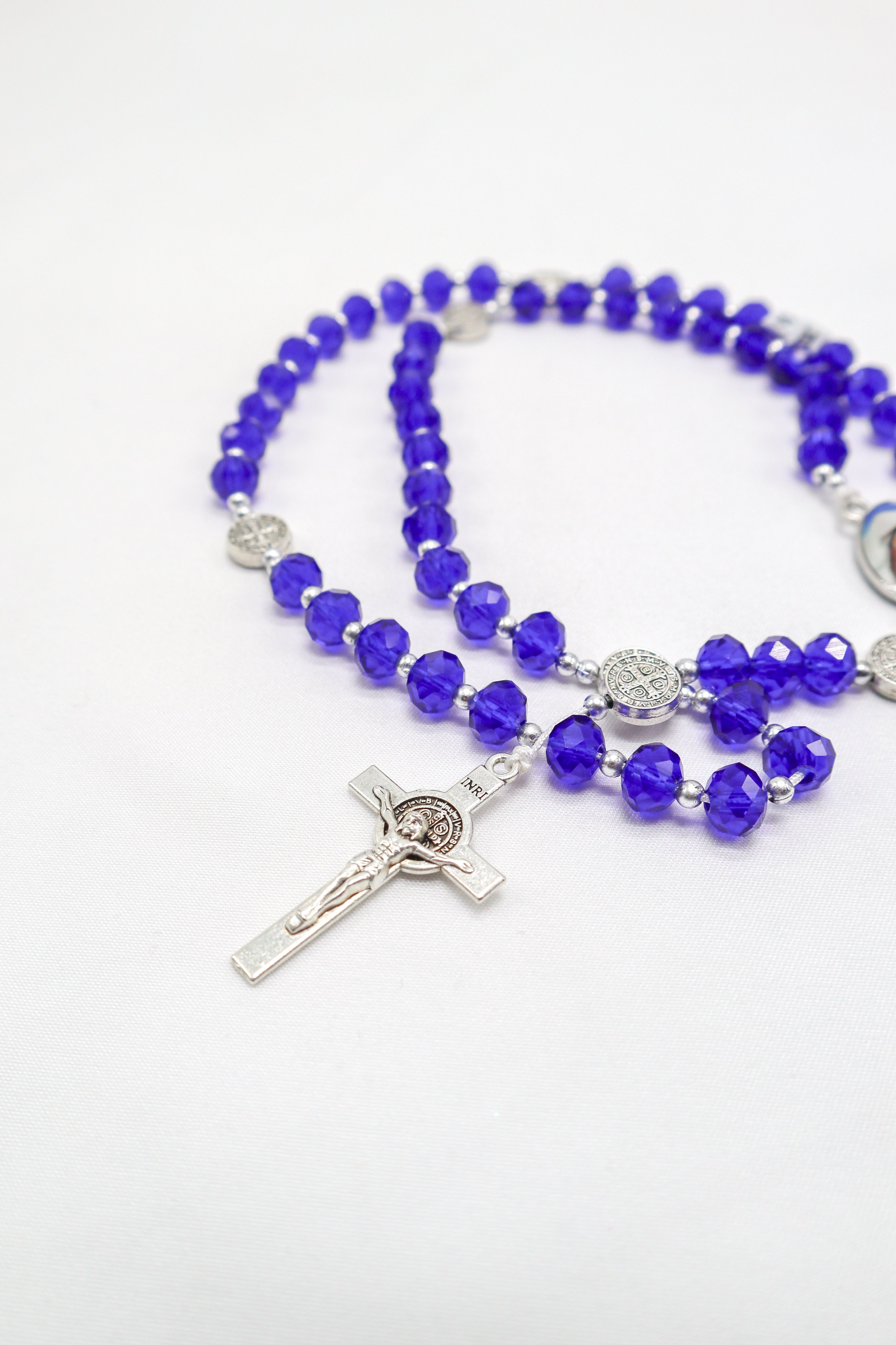 Elegant Rosary with Blue Beads on White Background · Free Stock Photo