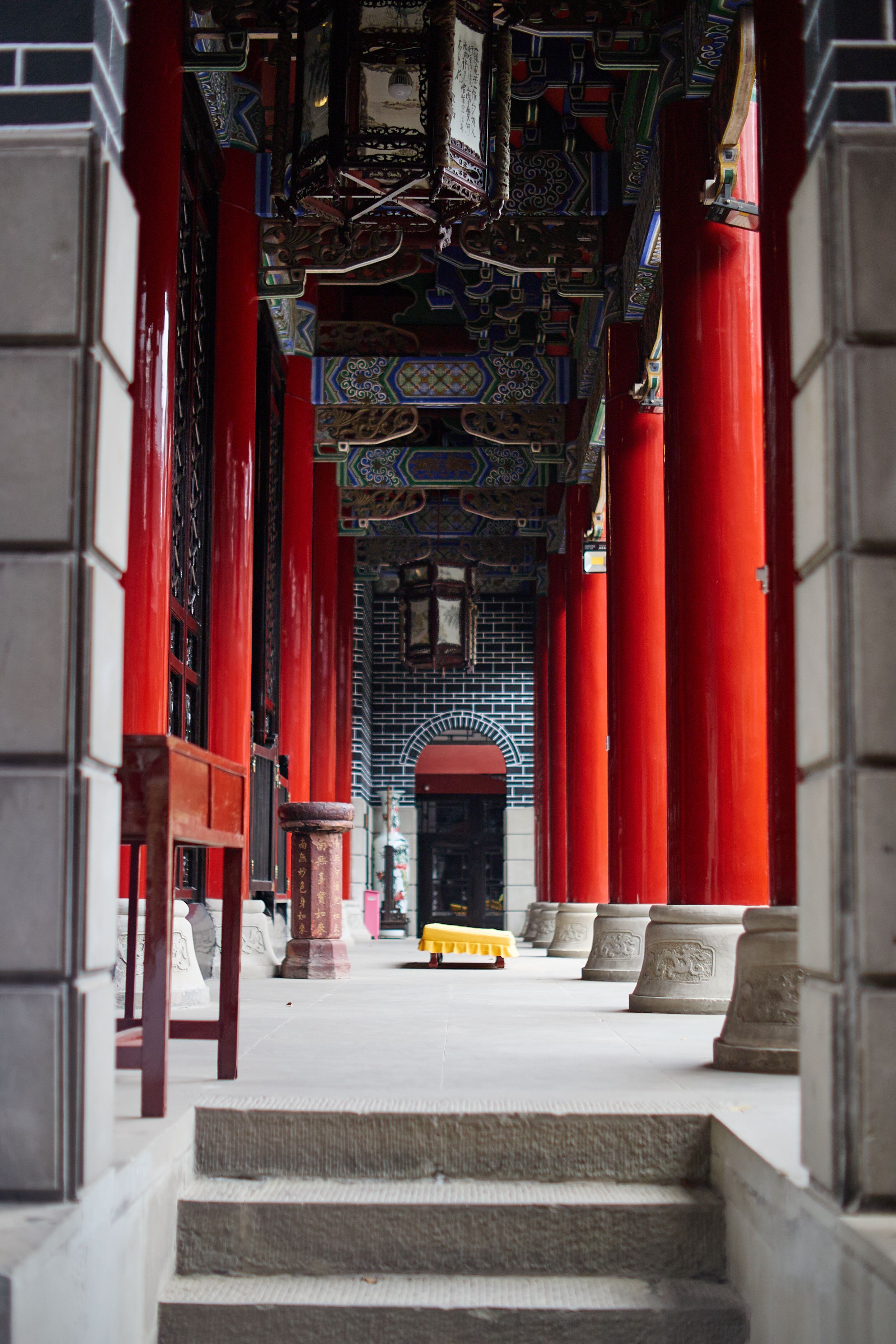 Traditional Chinese Temple Interior with Red Columns · Free Stock Photo