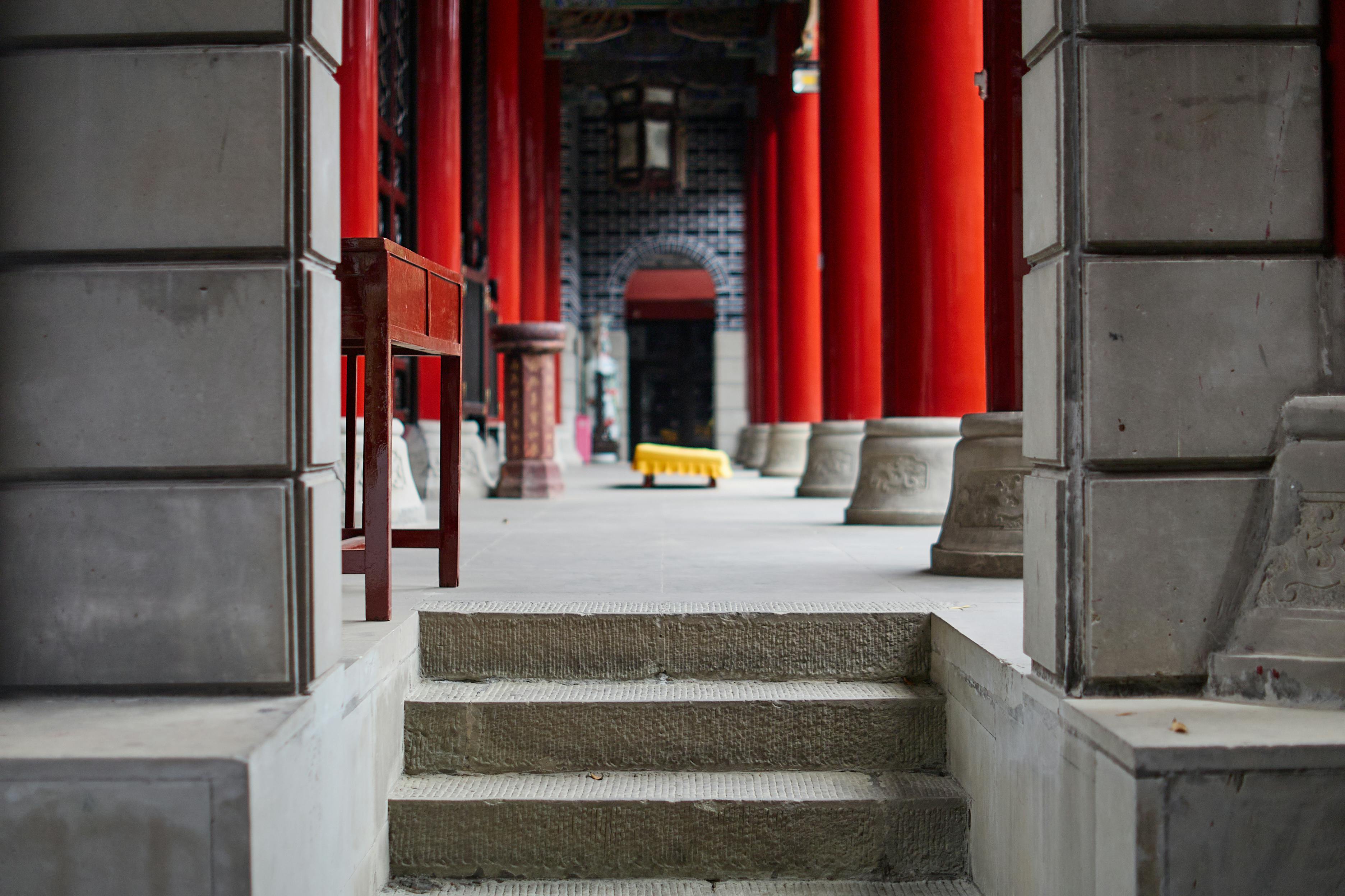 Traditional Asian Temple Hallway with Red Columns · Free Stock Photo