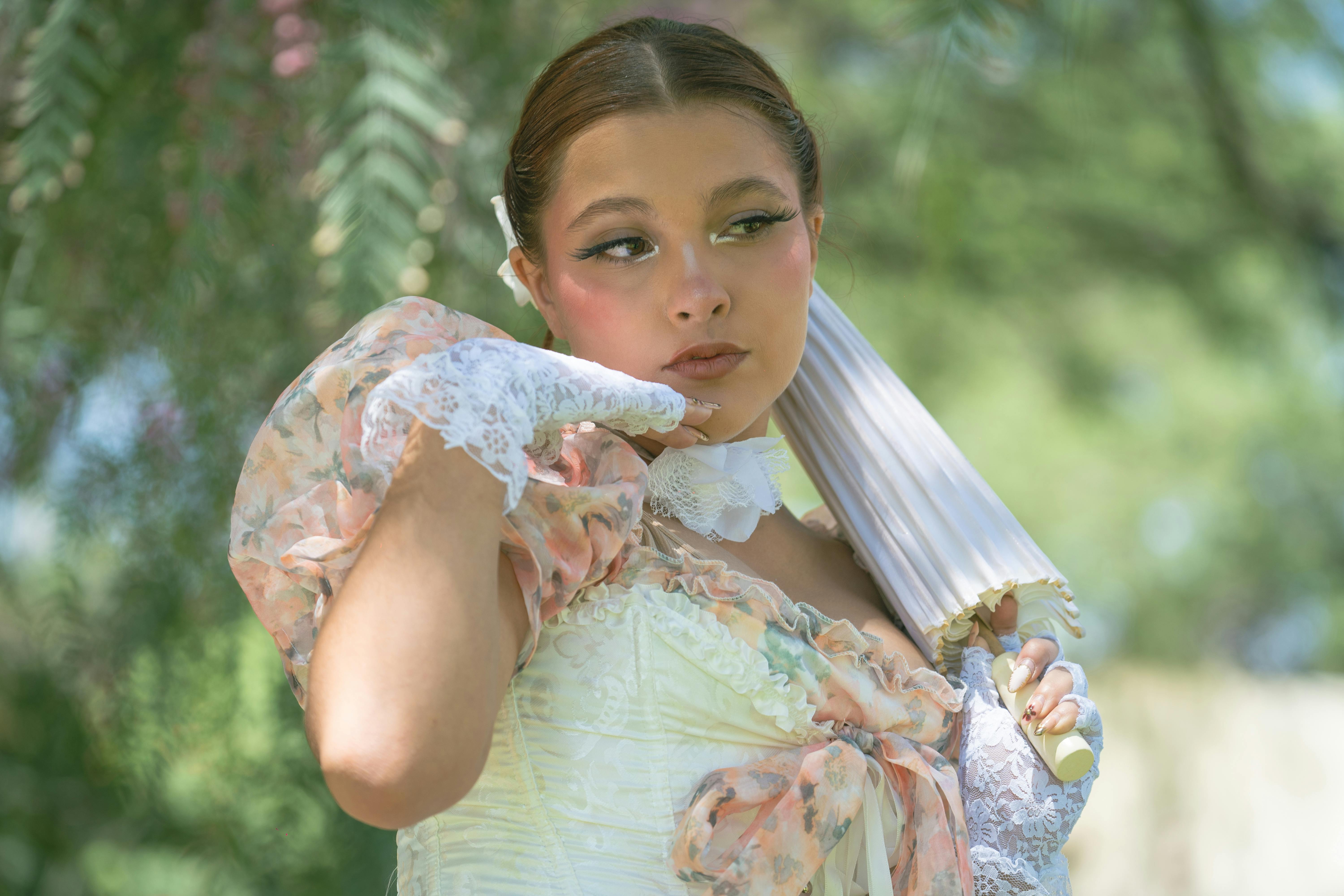Elegant Woman in Victorian Attire Outdoors · Free Stock Photo