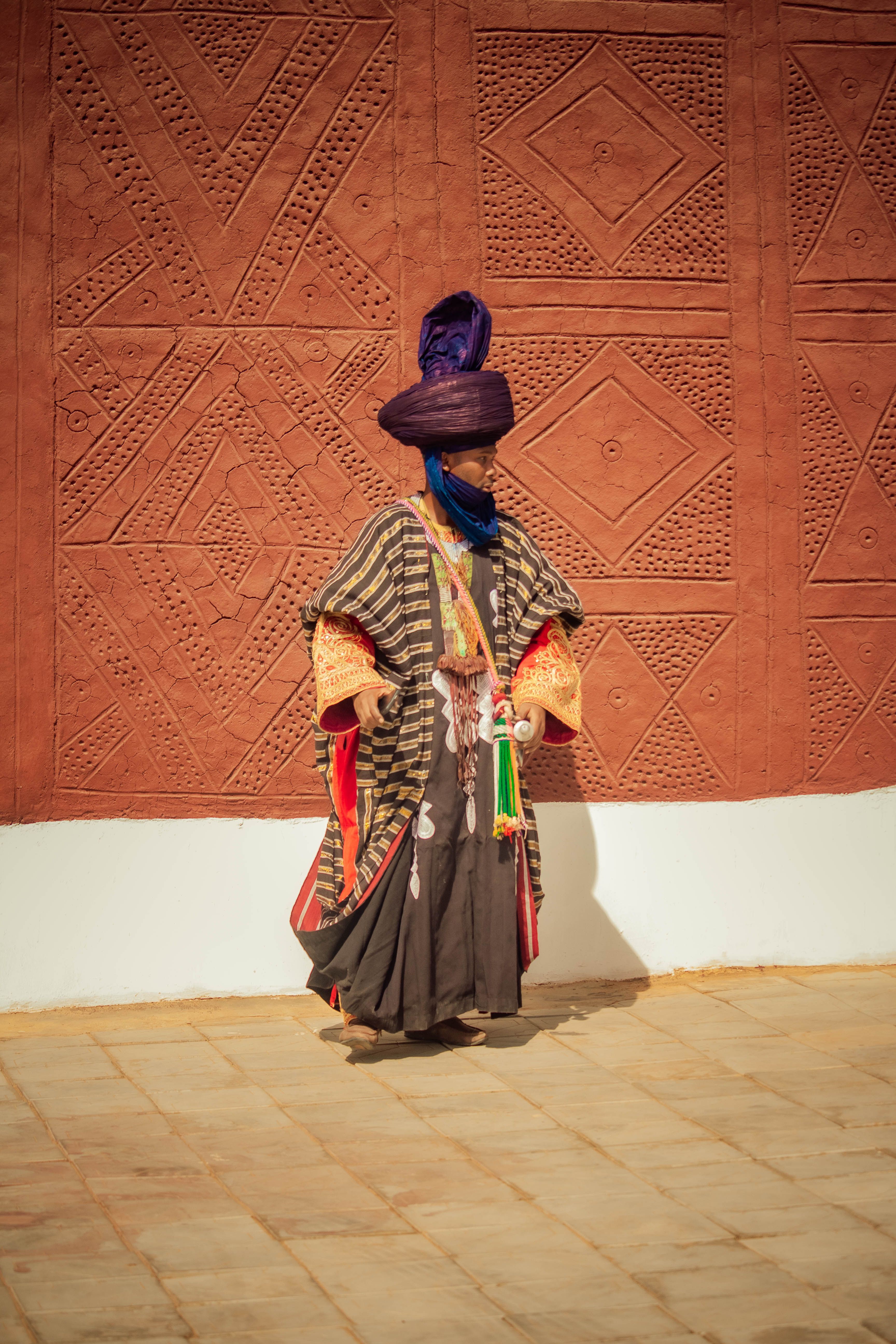 Man in Traditional Colorful Tuareg Attire · Free Stock Photo