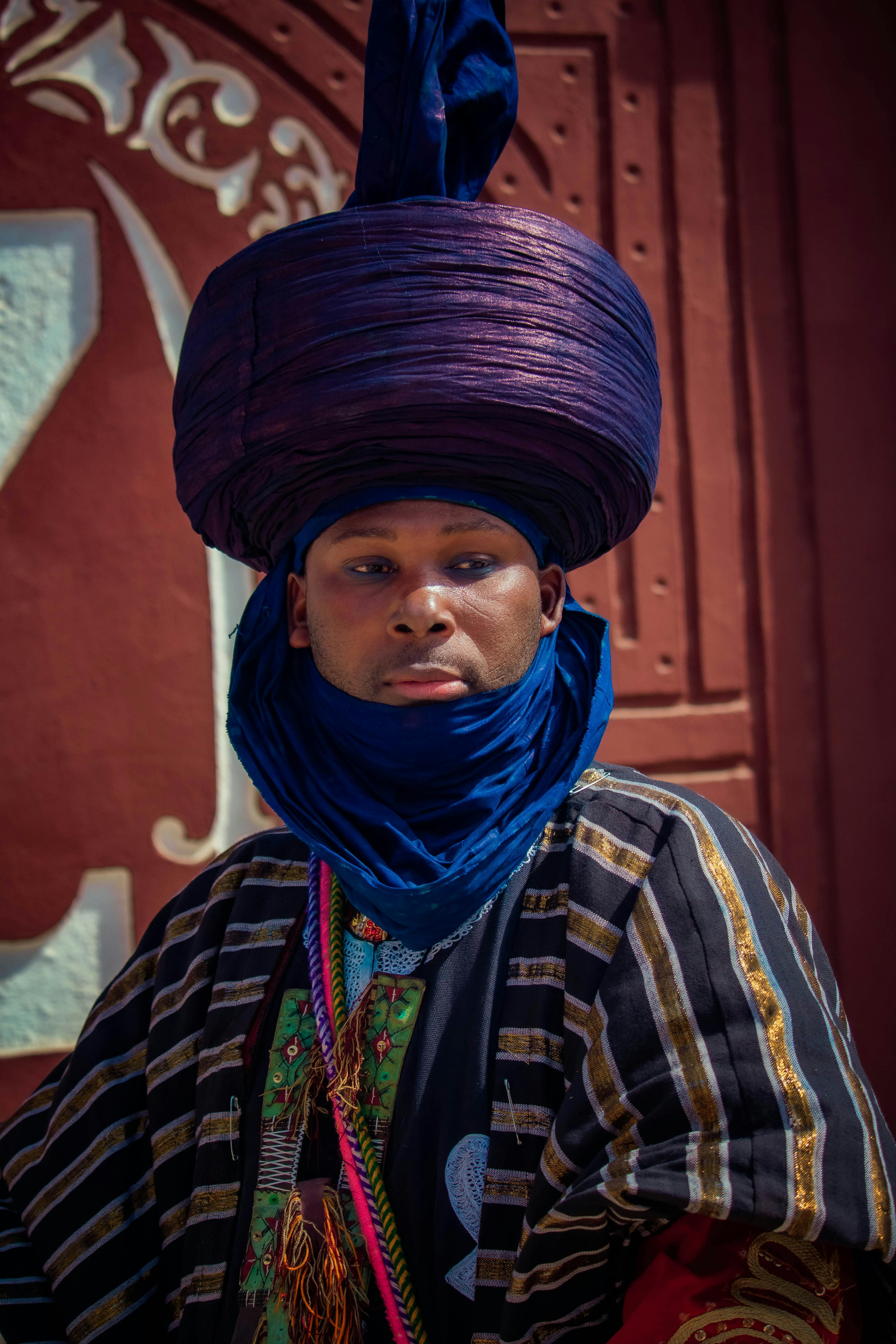 Traditional Turbaned Attire Portrait in Sunlight · Free Stock Photo