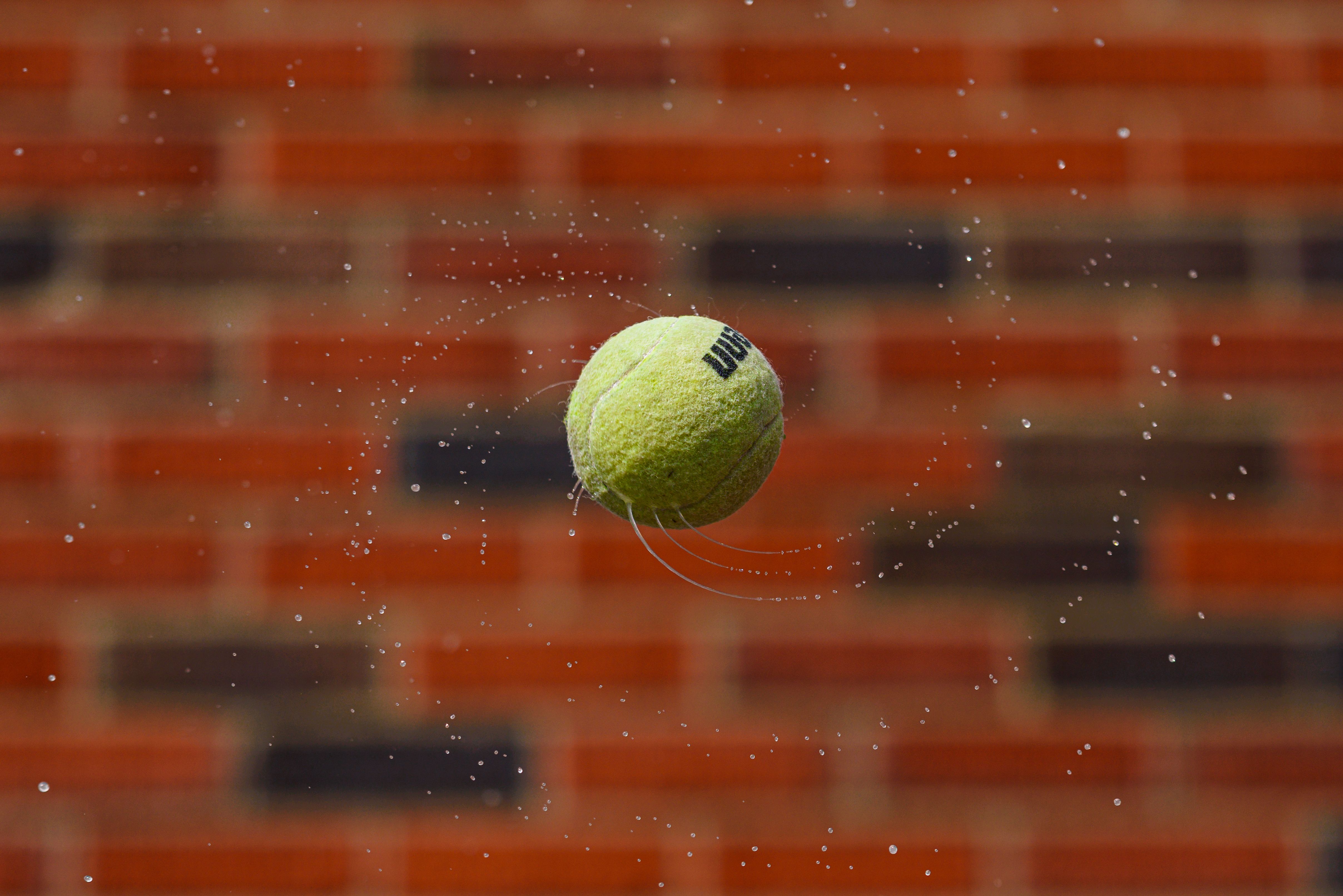 High-Speed Capture of Tennis Ball in Motion · Free Stock Photo