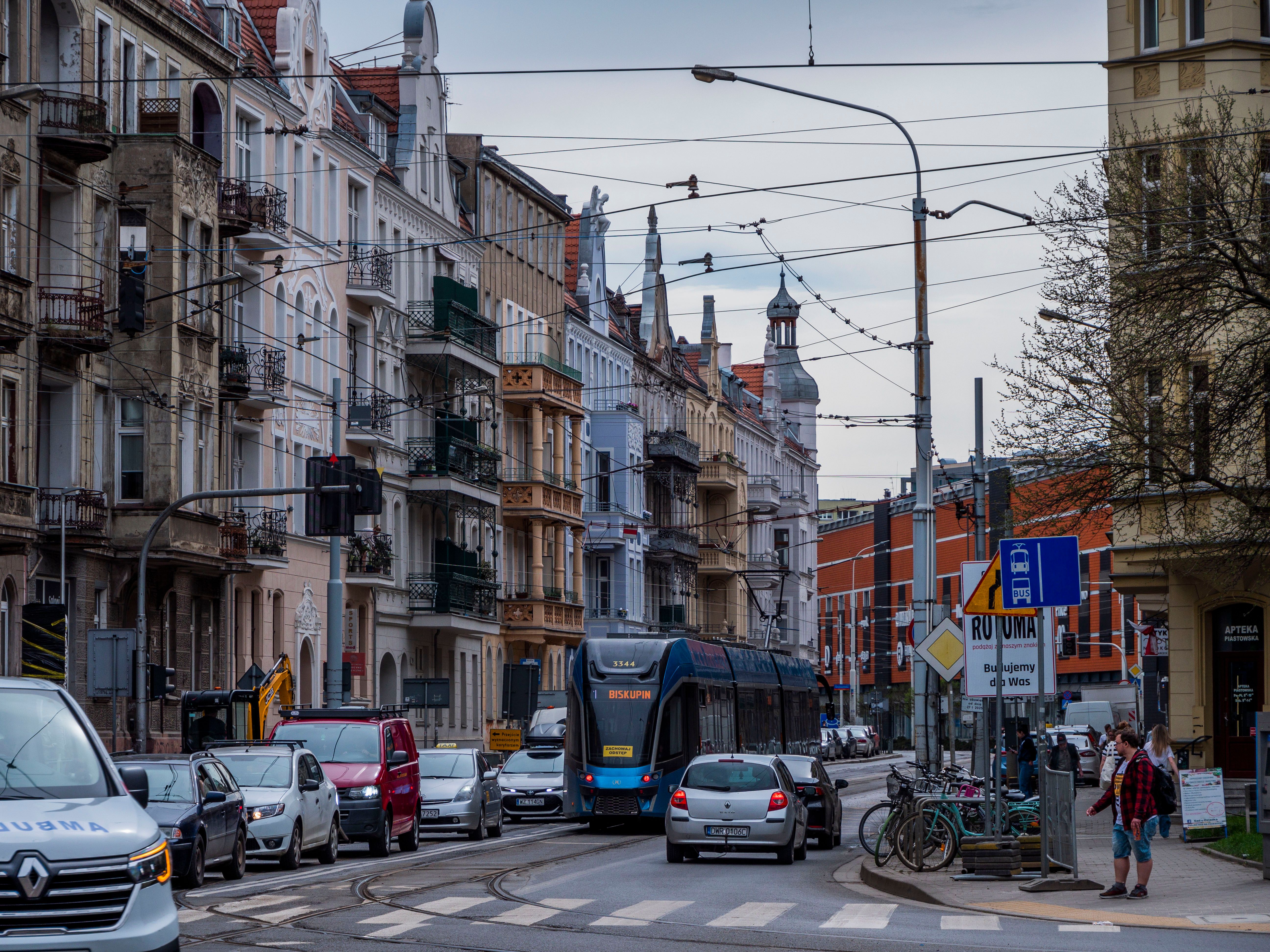 European Urban Street with Trams and Cars · Free Stock Photo