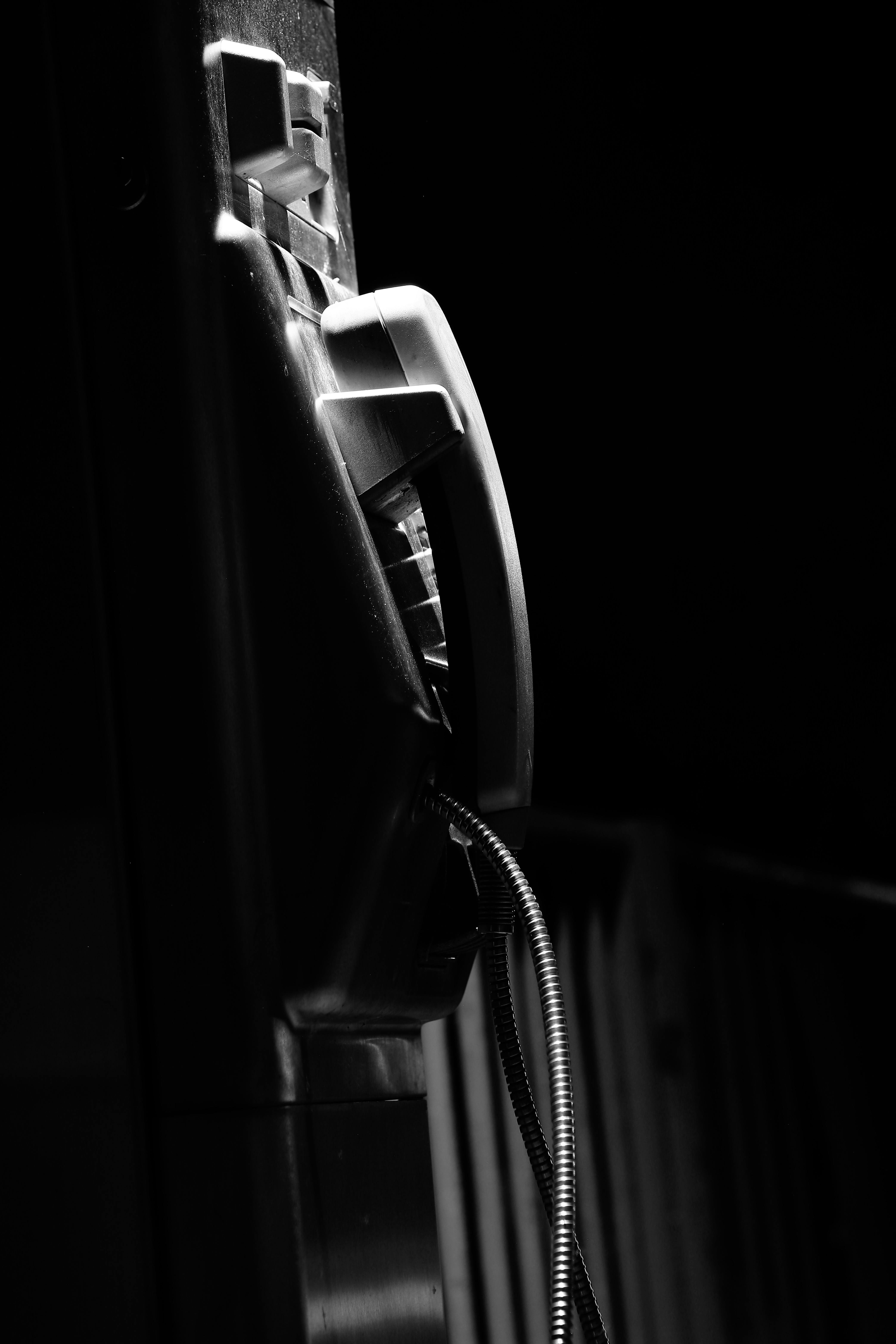 Vintage Payphone in Dramatic Monochrome · Free Stock Photo