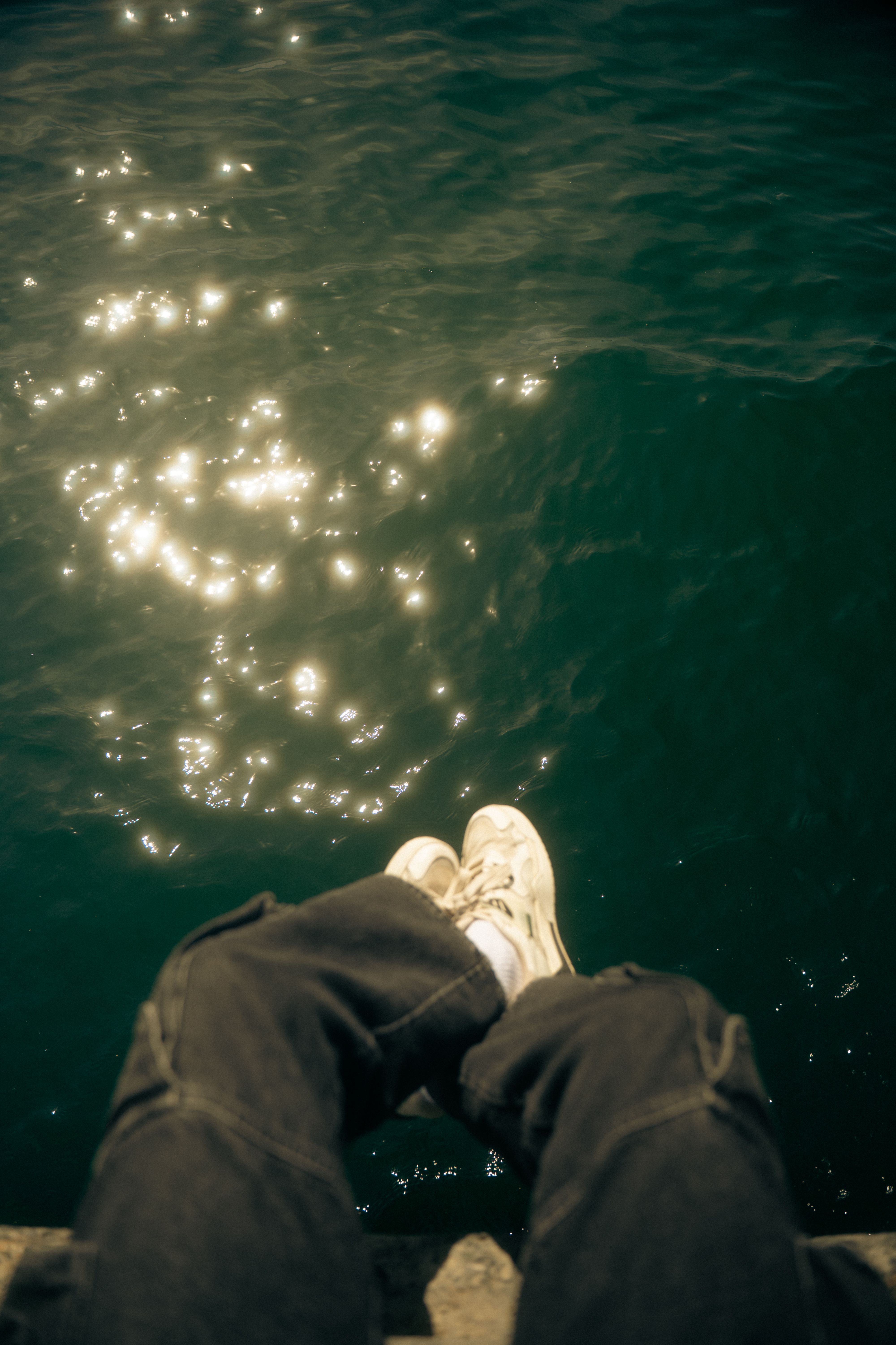 Person Sitting With Feet Dangling Photos, Download The BEST Free Person ...