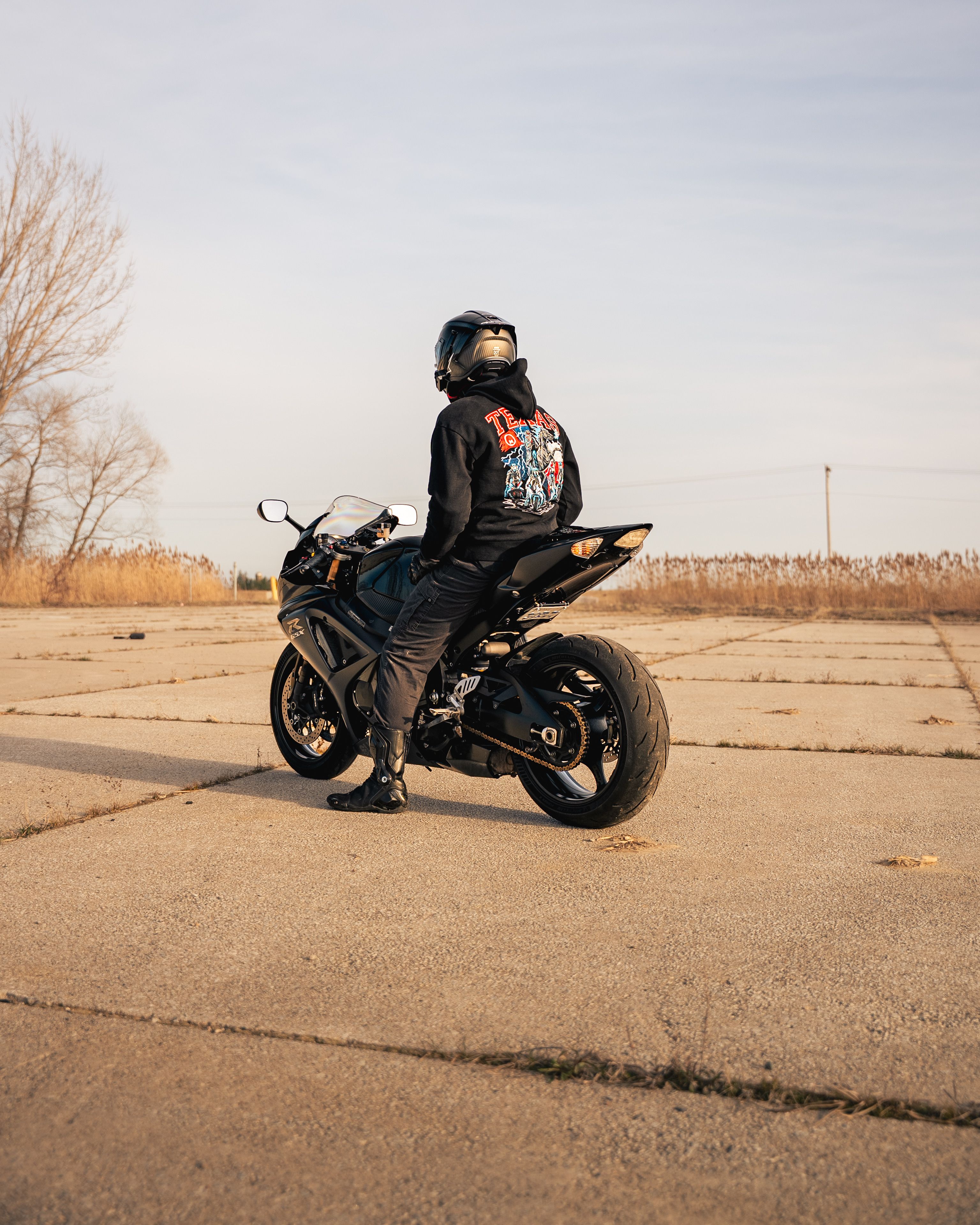 Biker on Sport Motorcycle in Open Area · Free Stock Photo