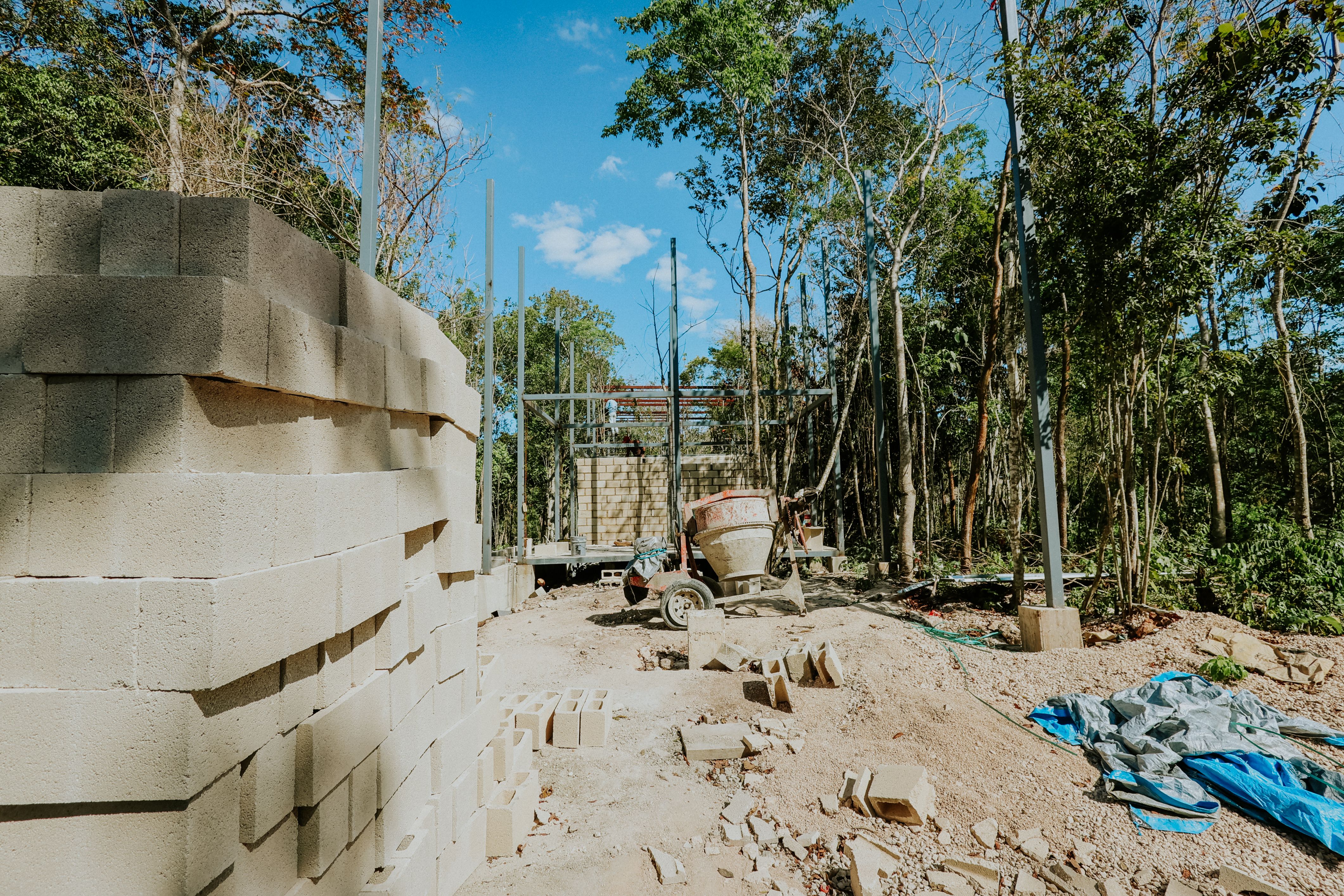 Construction Site in Forest with Building Blocks · Free Stock Photo