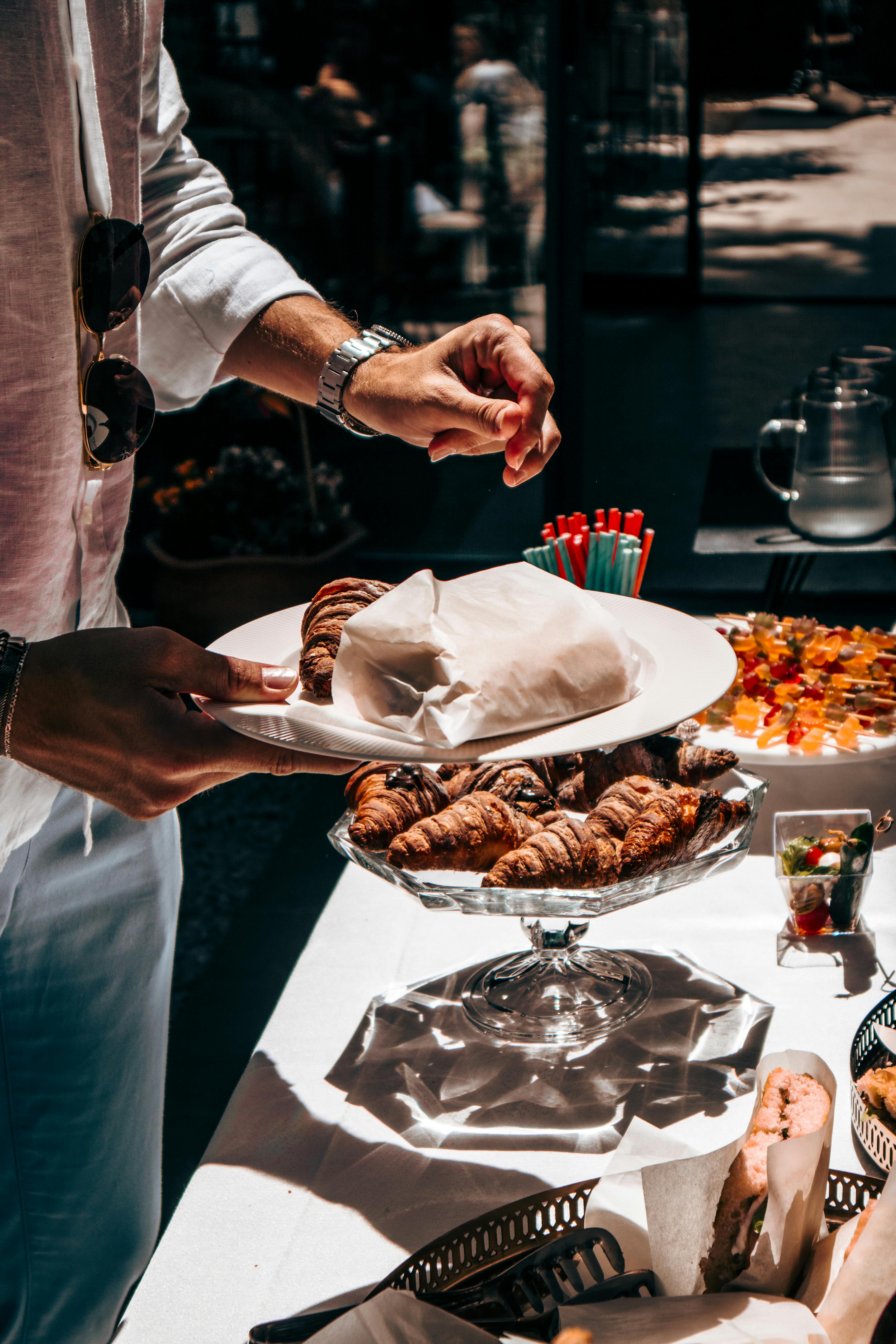 Elegant Brunch Setup with Croissants and Snacks · Free Stock Photo