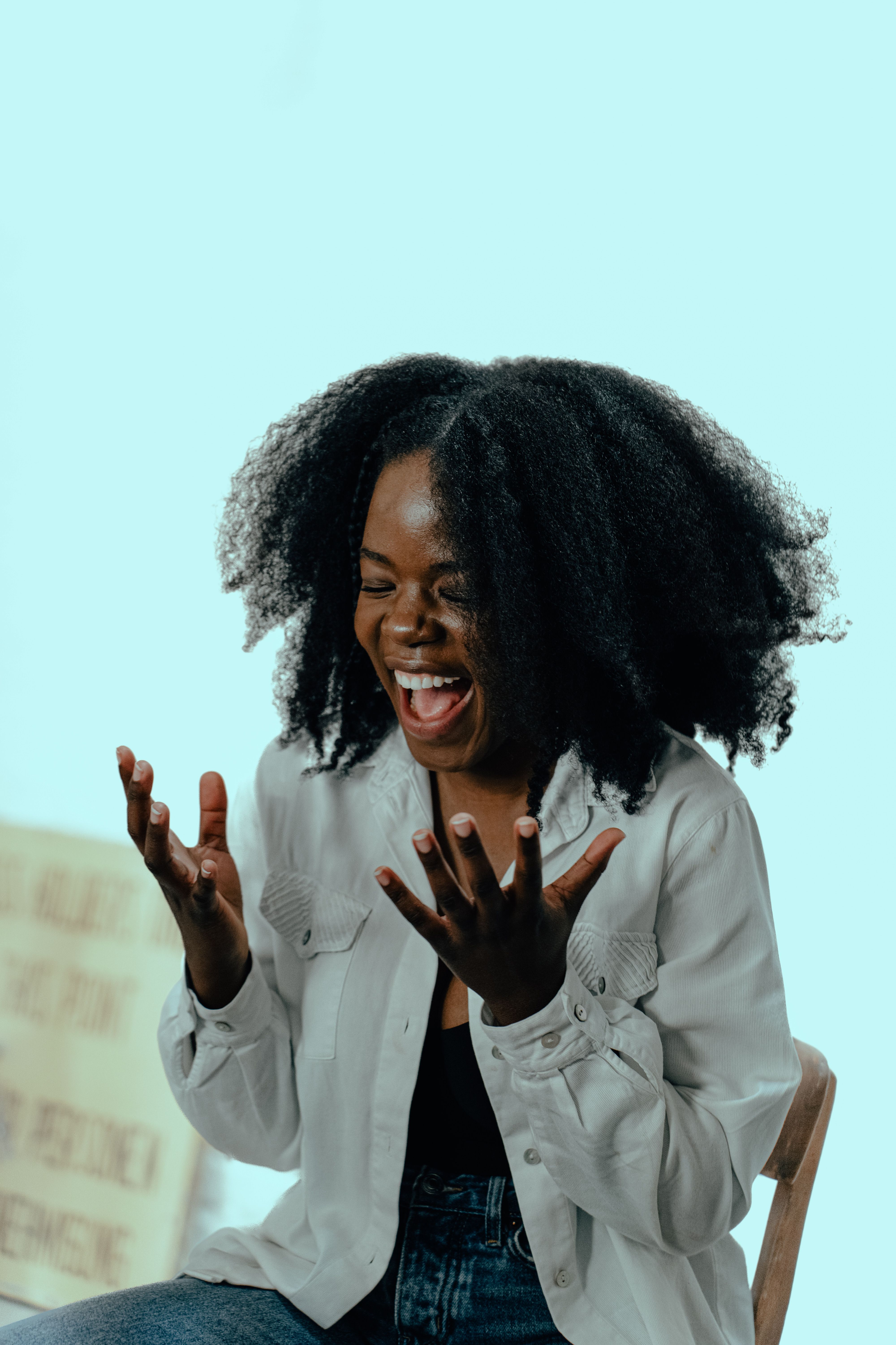 Joyful Woman Expressing Happiness Indoors · Free Stock Photo