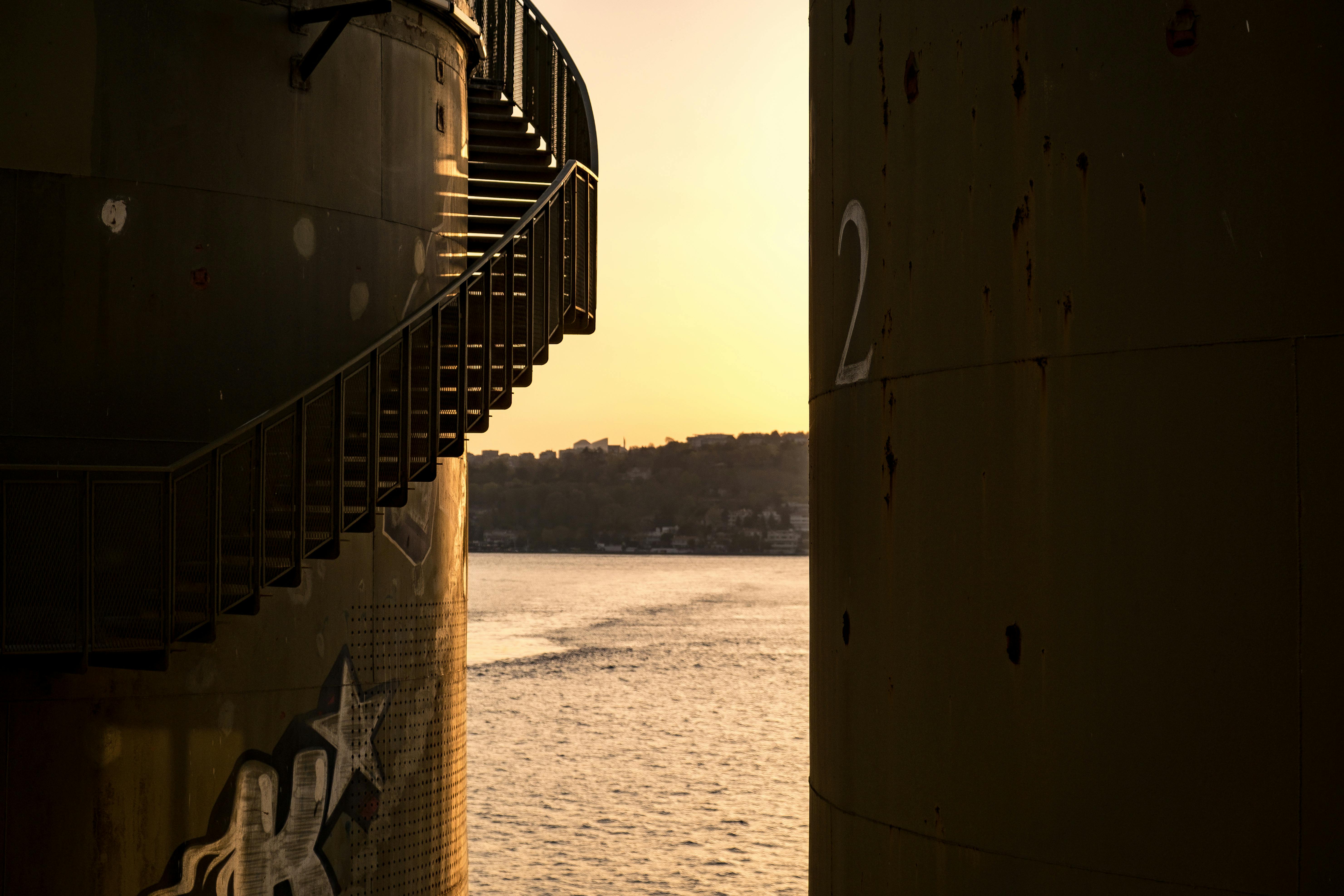 Industrial Staircase at Sunset by the Sea · Free Stock Photo