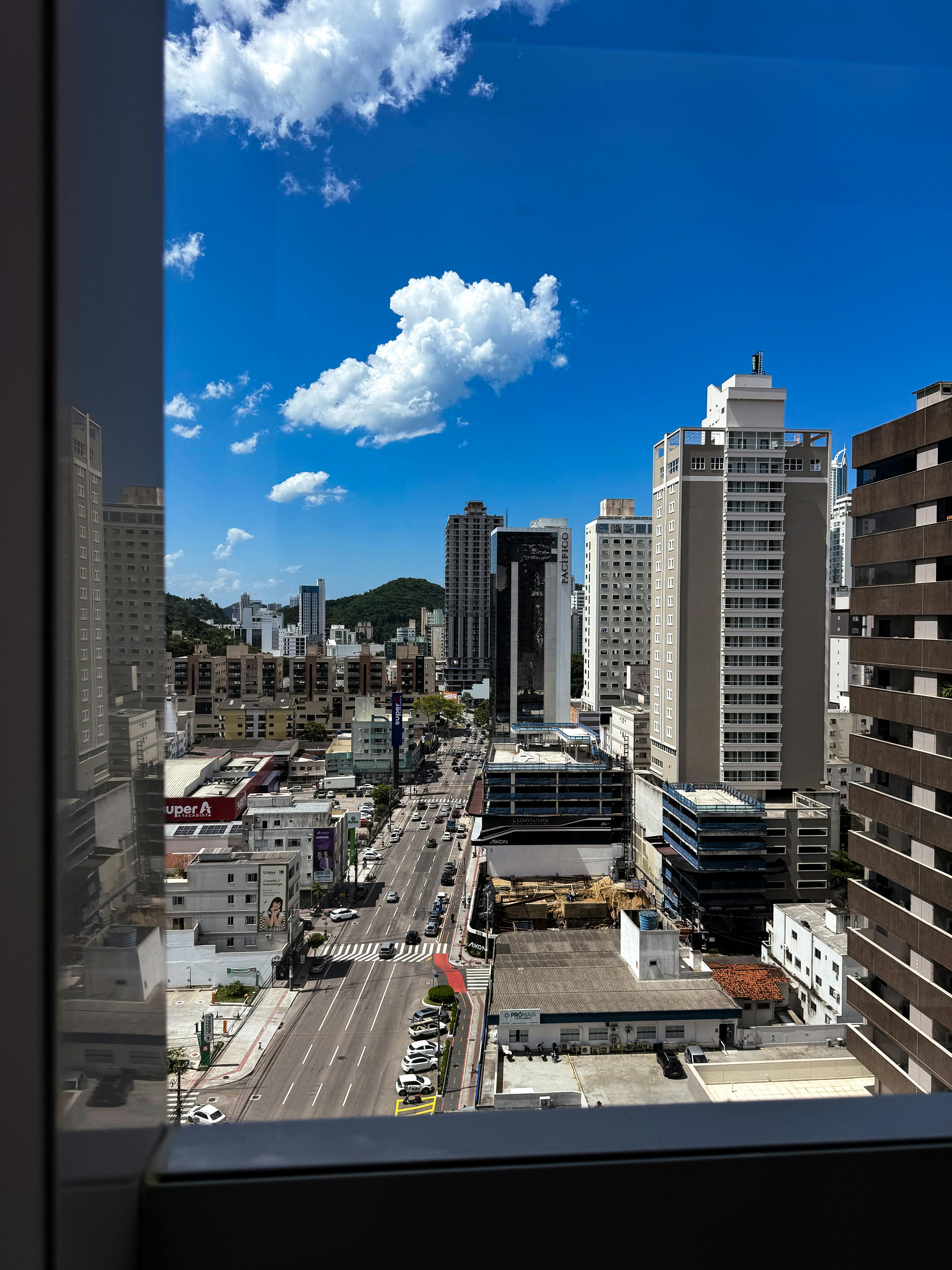 Vibrant Cityscape View from High-rise Window · Free Stock Photo
