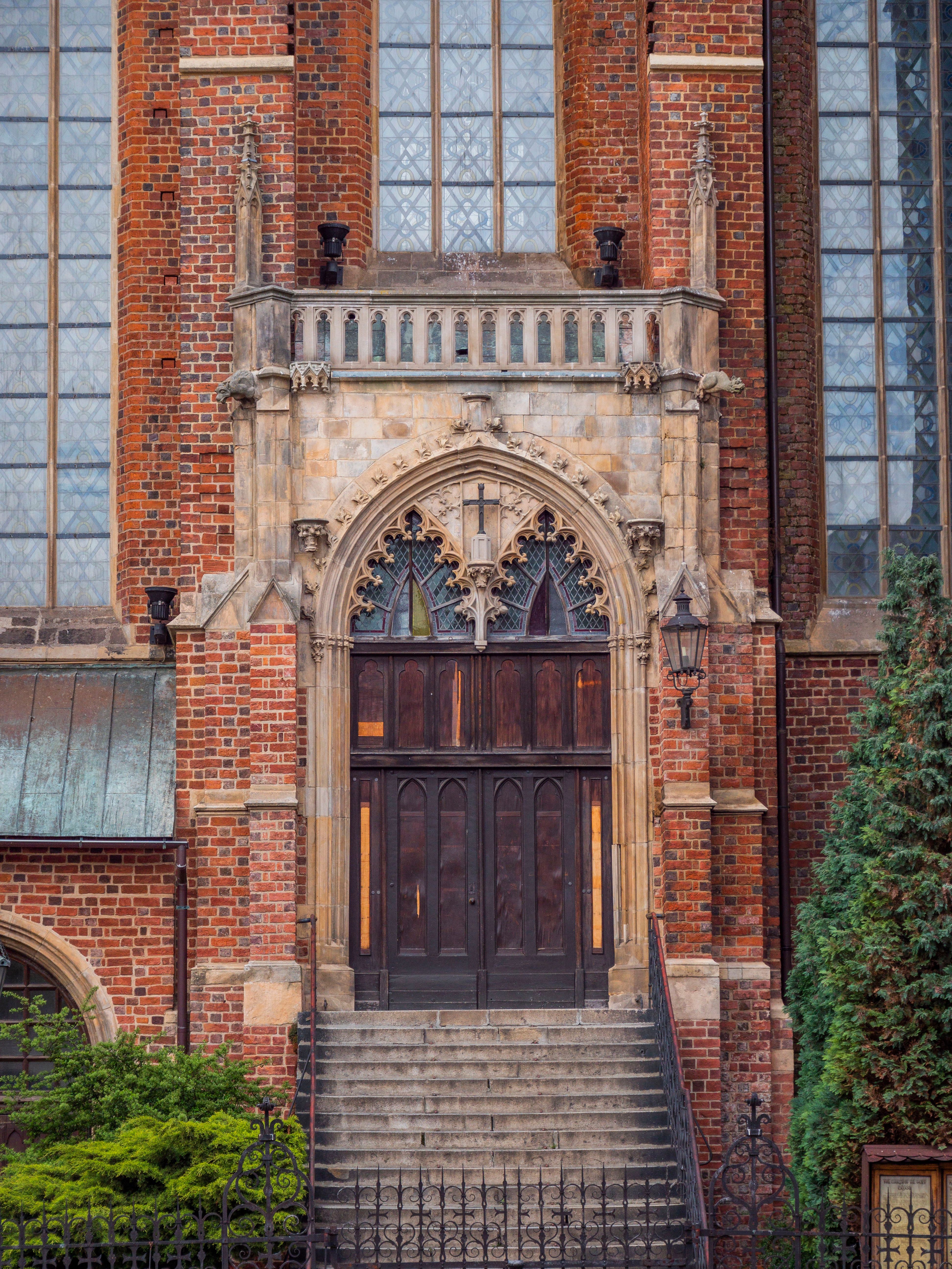 Gothic Church Entrance with Detailed Architecture · Free Stock Photo